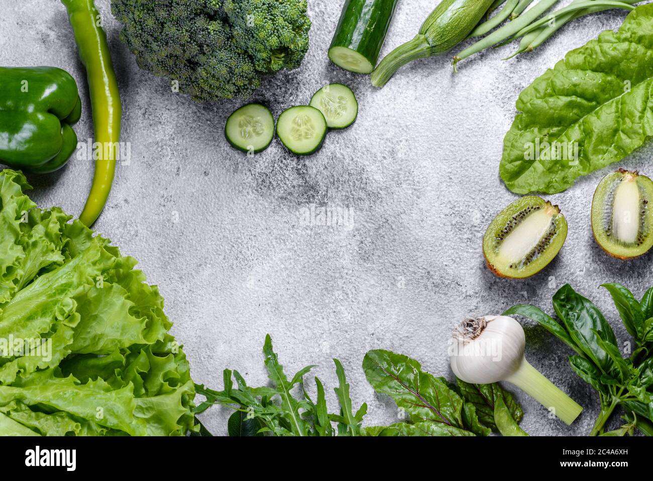 Flat lay series of assorted green toned vegetables, fresh organic raw ...