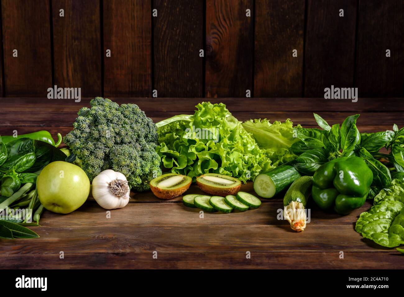 Flat lay series of assorted green toned vegetables, fresh organic raw ...