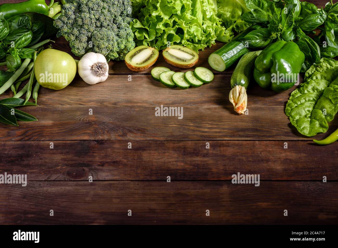 Flat lay series of assorted green toned vegetables, fresh organic raw ...
