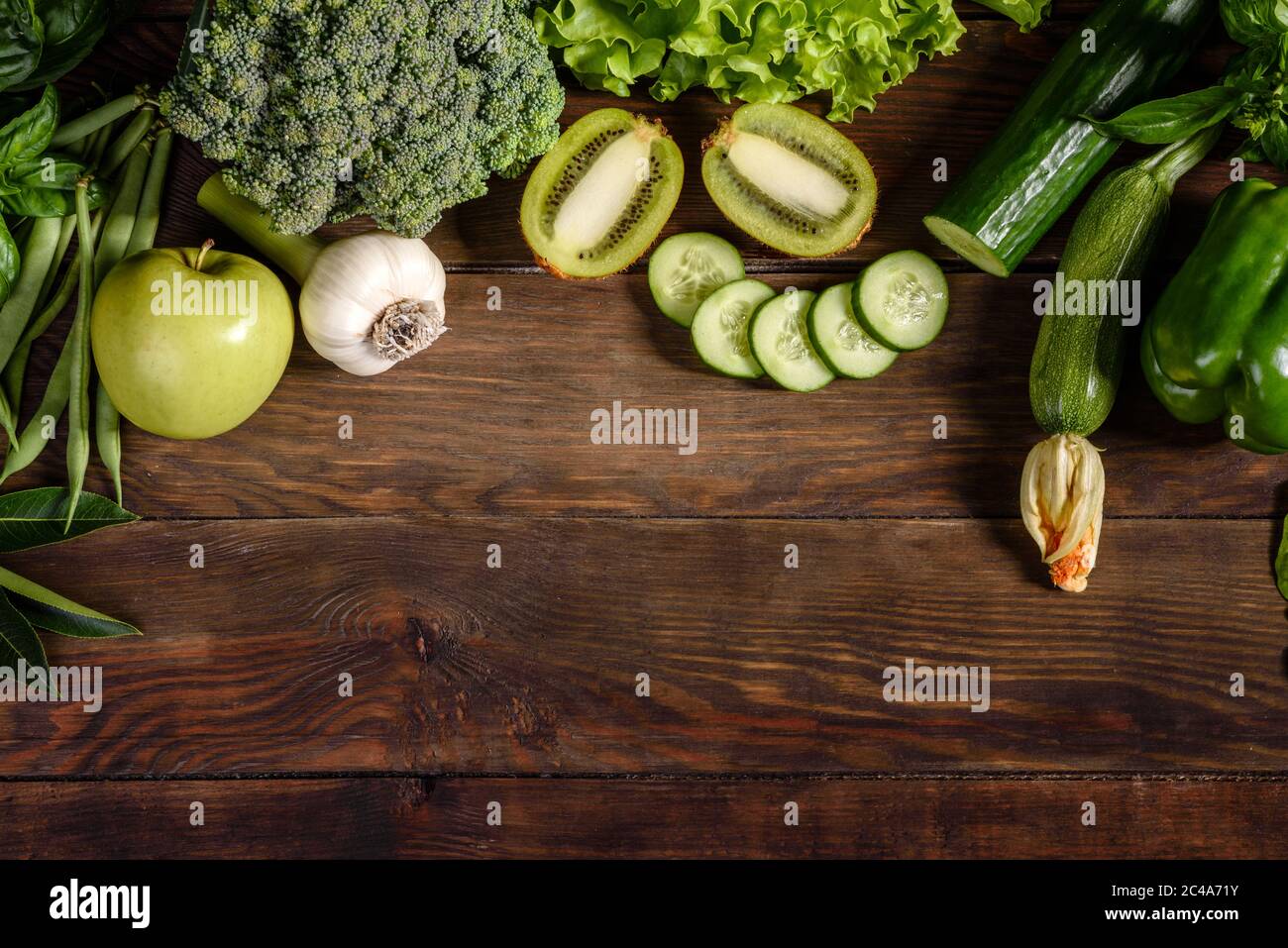 Flat lay series of assorted green toned vegetables, fresh organic raw ...