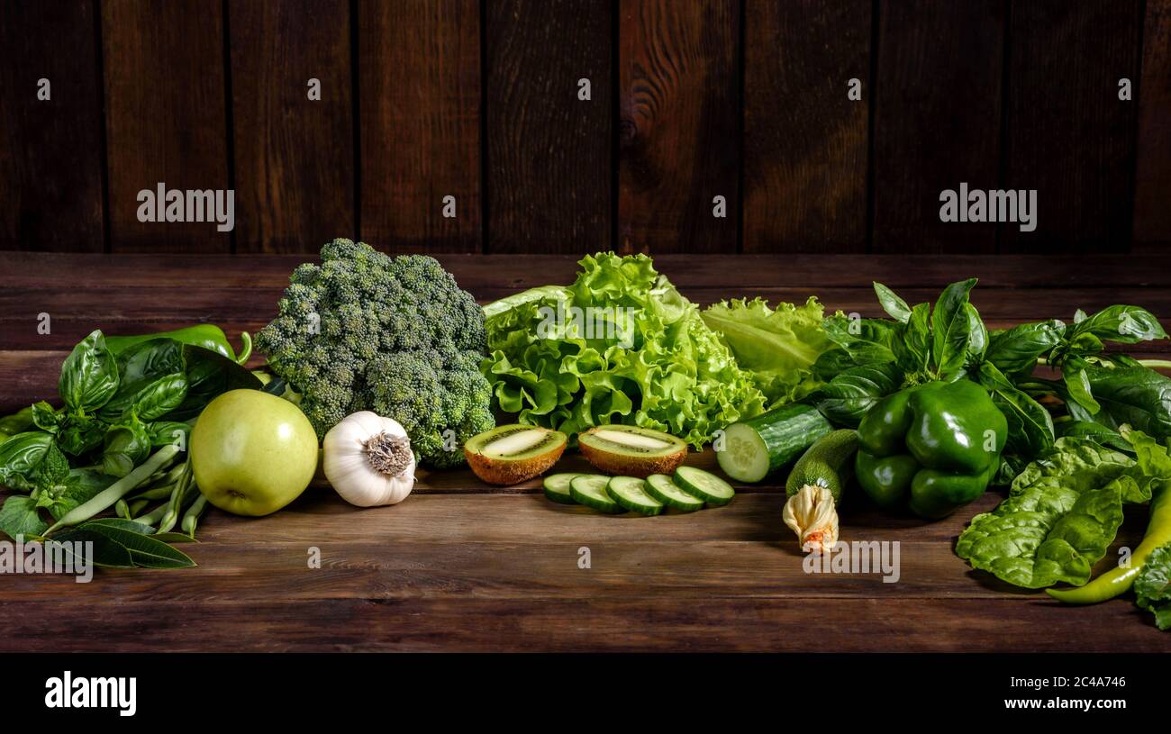 Flat lay series of assorted green toned vegetables, fresh organic raw ...