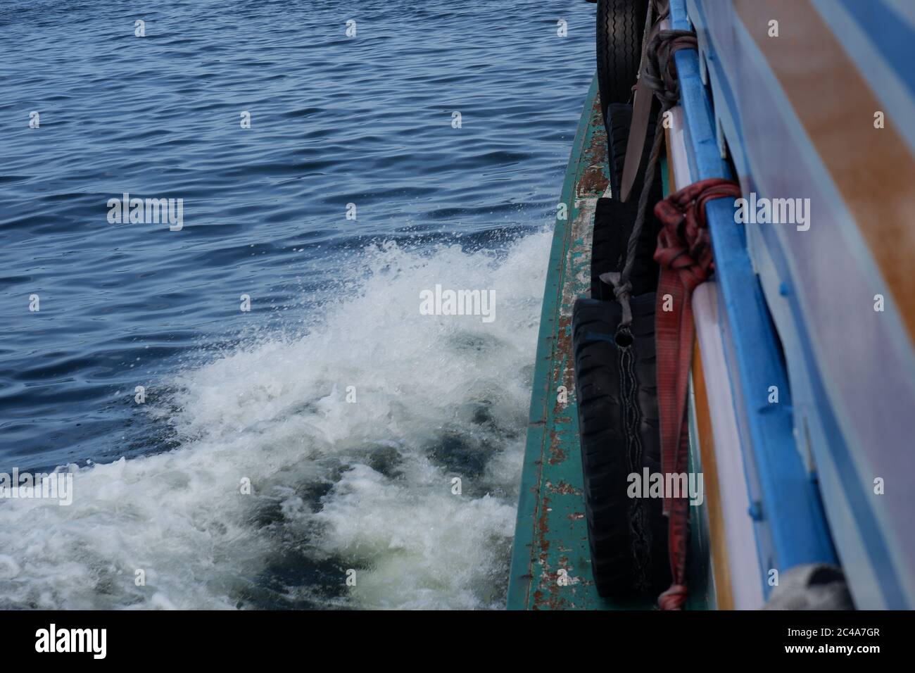 Side view of a traveling boat Stock Photo - Alamy