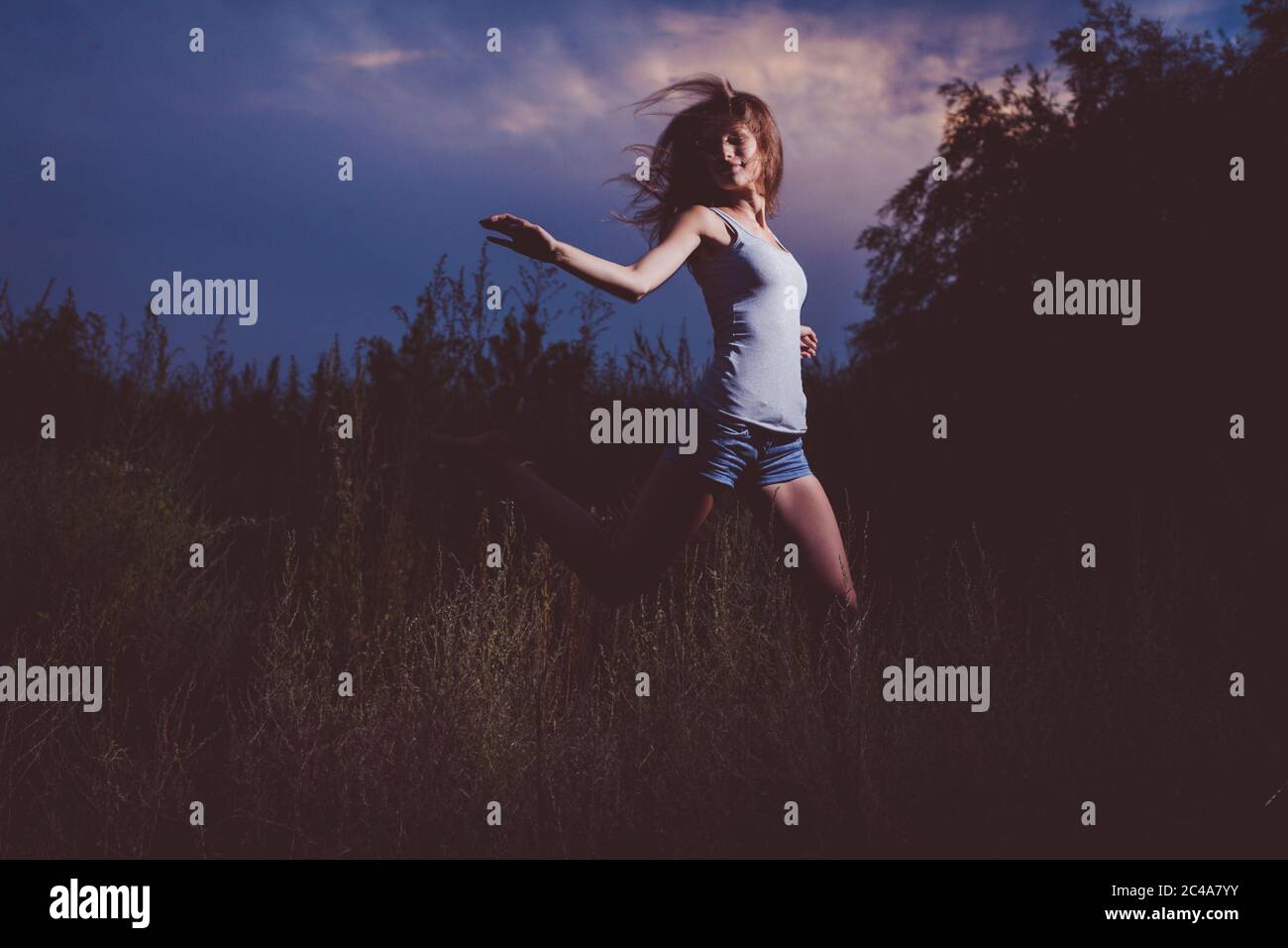 Woman silhouette running away hi-res stock photography and images - Alamy