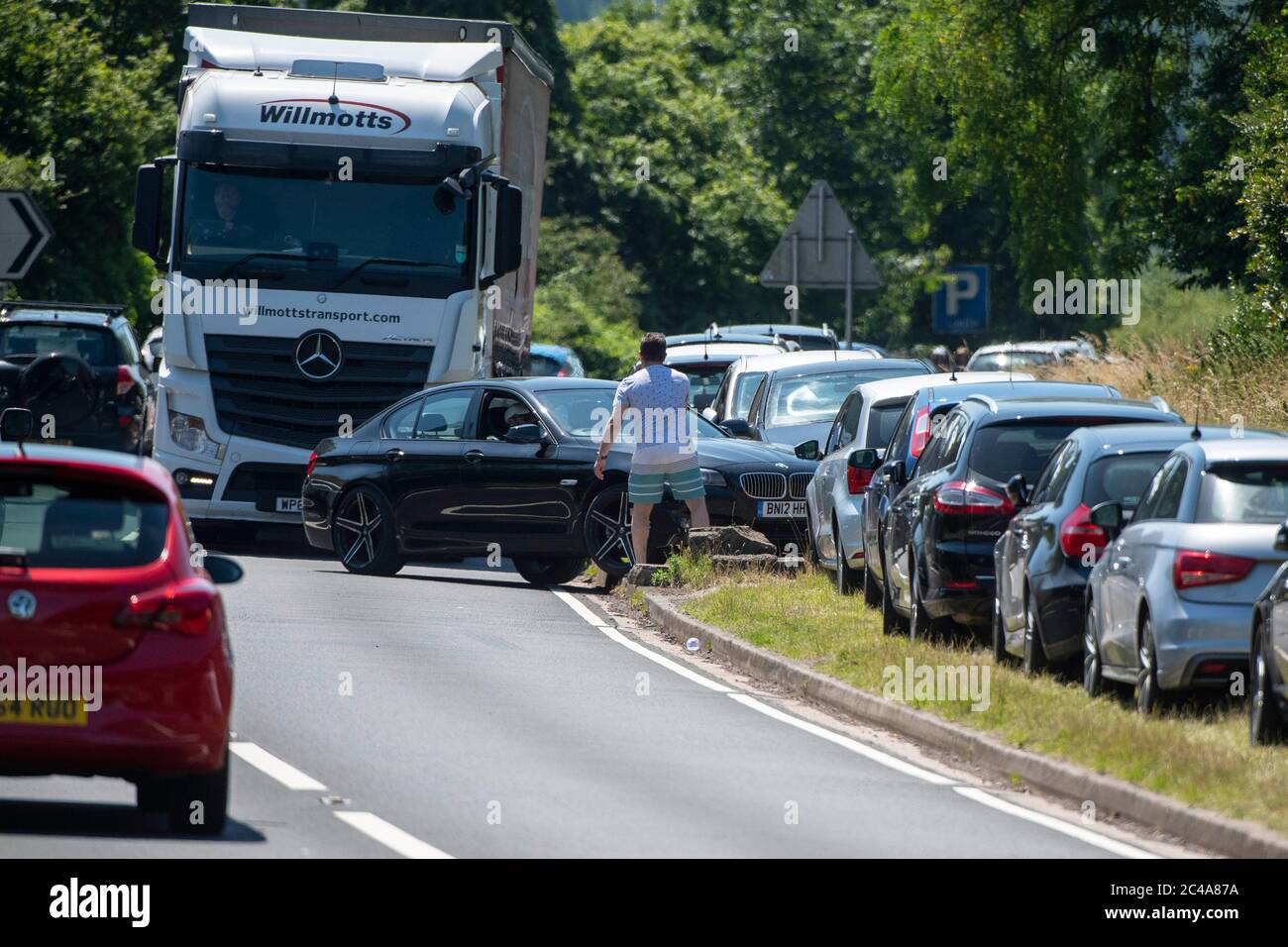Cars parked on the A36 to access Warleigh Weir on the river Avon near ...