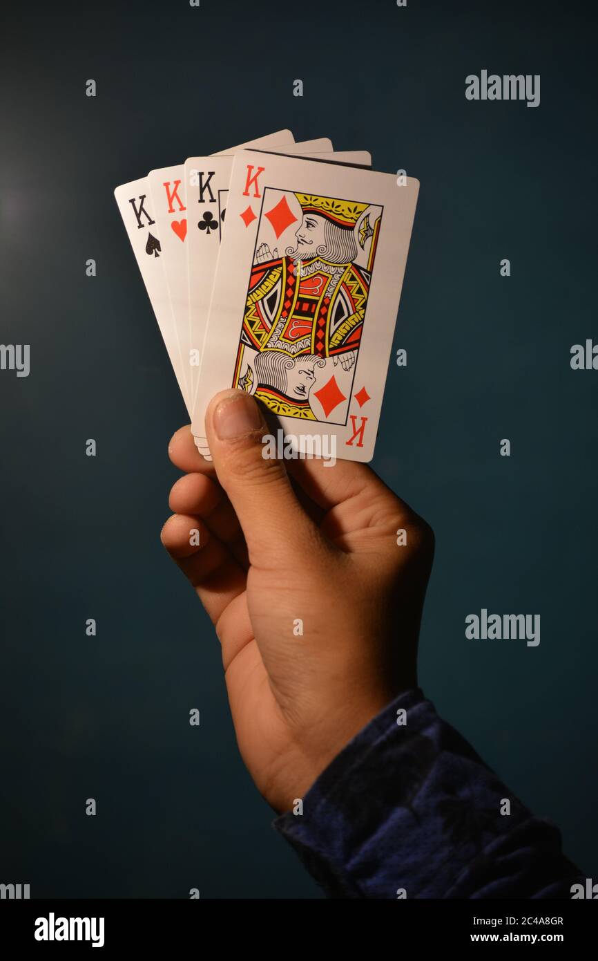 Four kings playing cards hi-res stock photography and images - Alamy