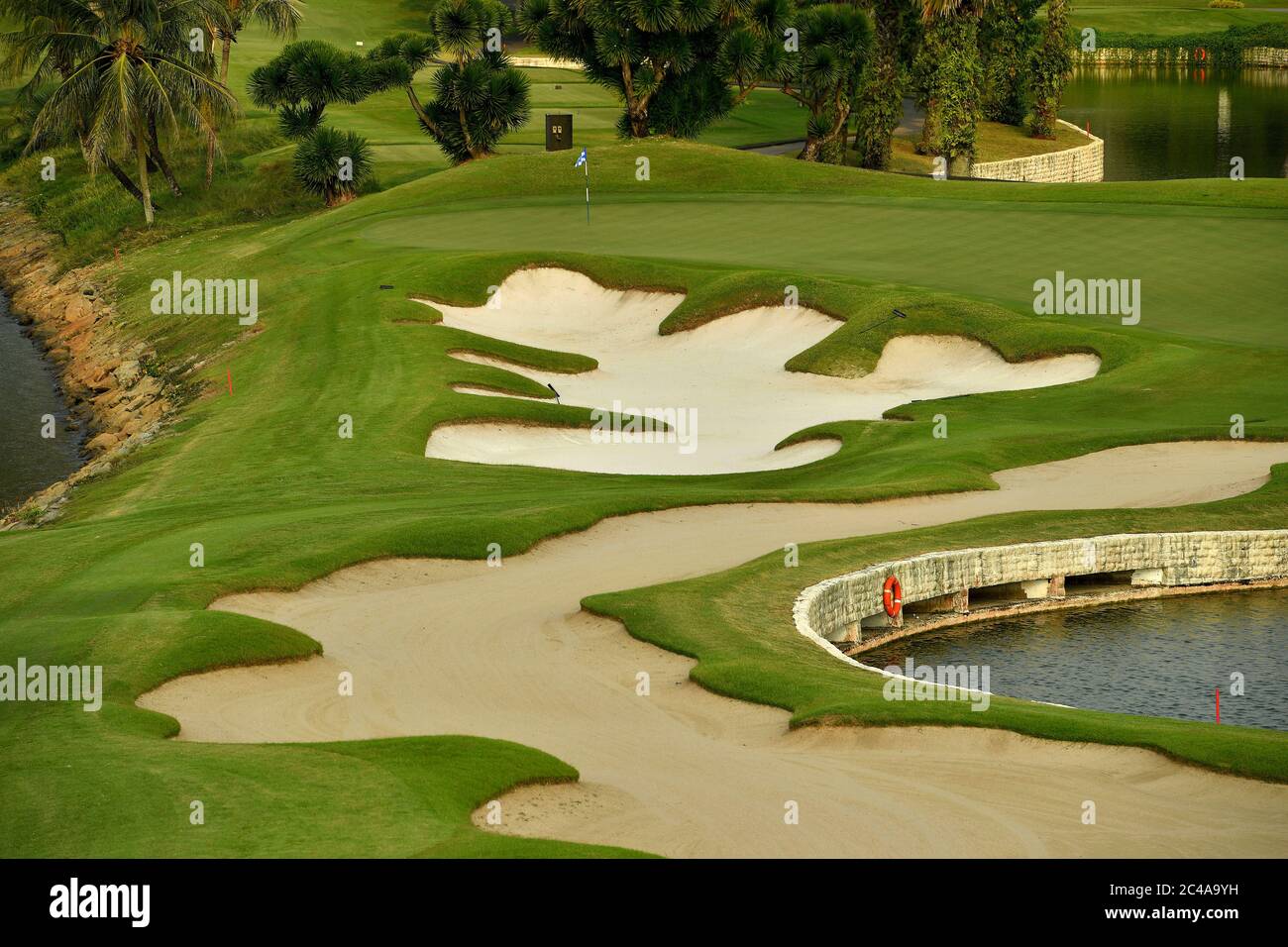 View of hole No 14 at Sentosa Golf Club (Serapong) on Sentosa Island in ...