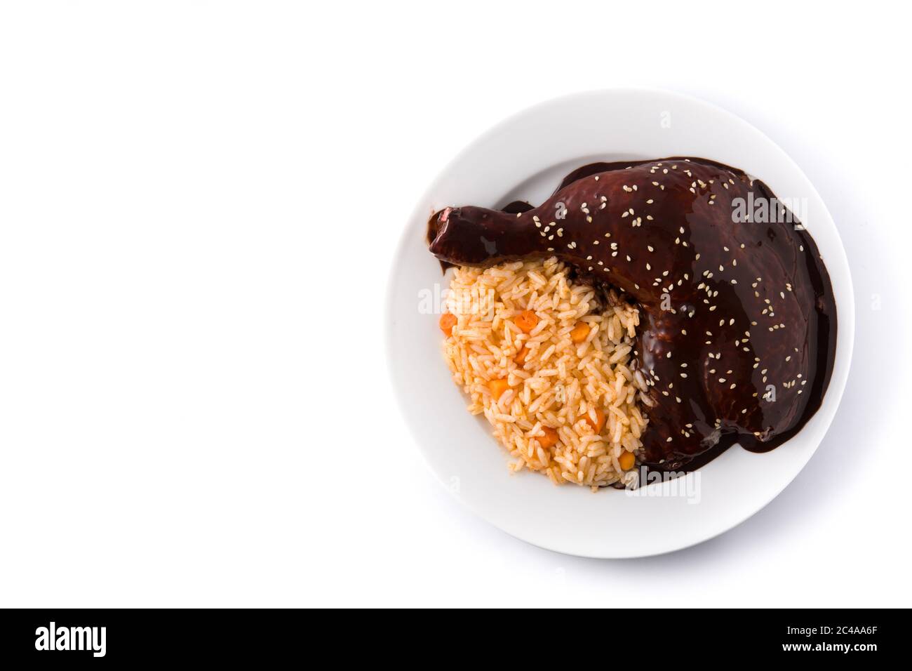 Traditional mole Poblano with rice in plate isolated on white ...