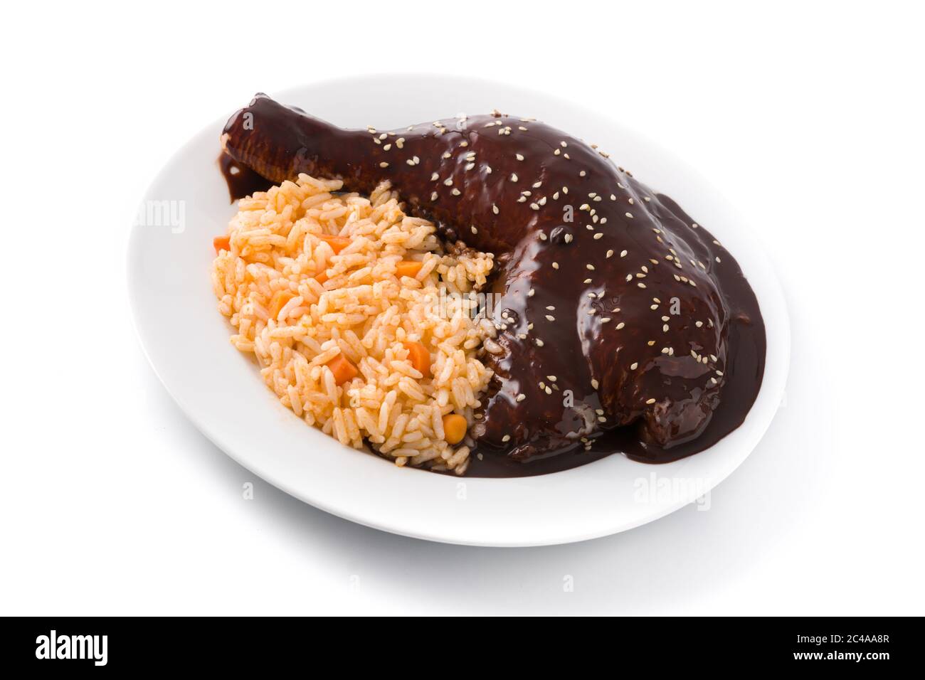 Traditional mole Poblano with rice in plate isolated on white ...
