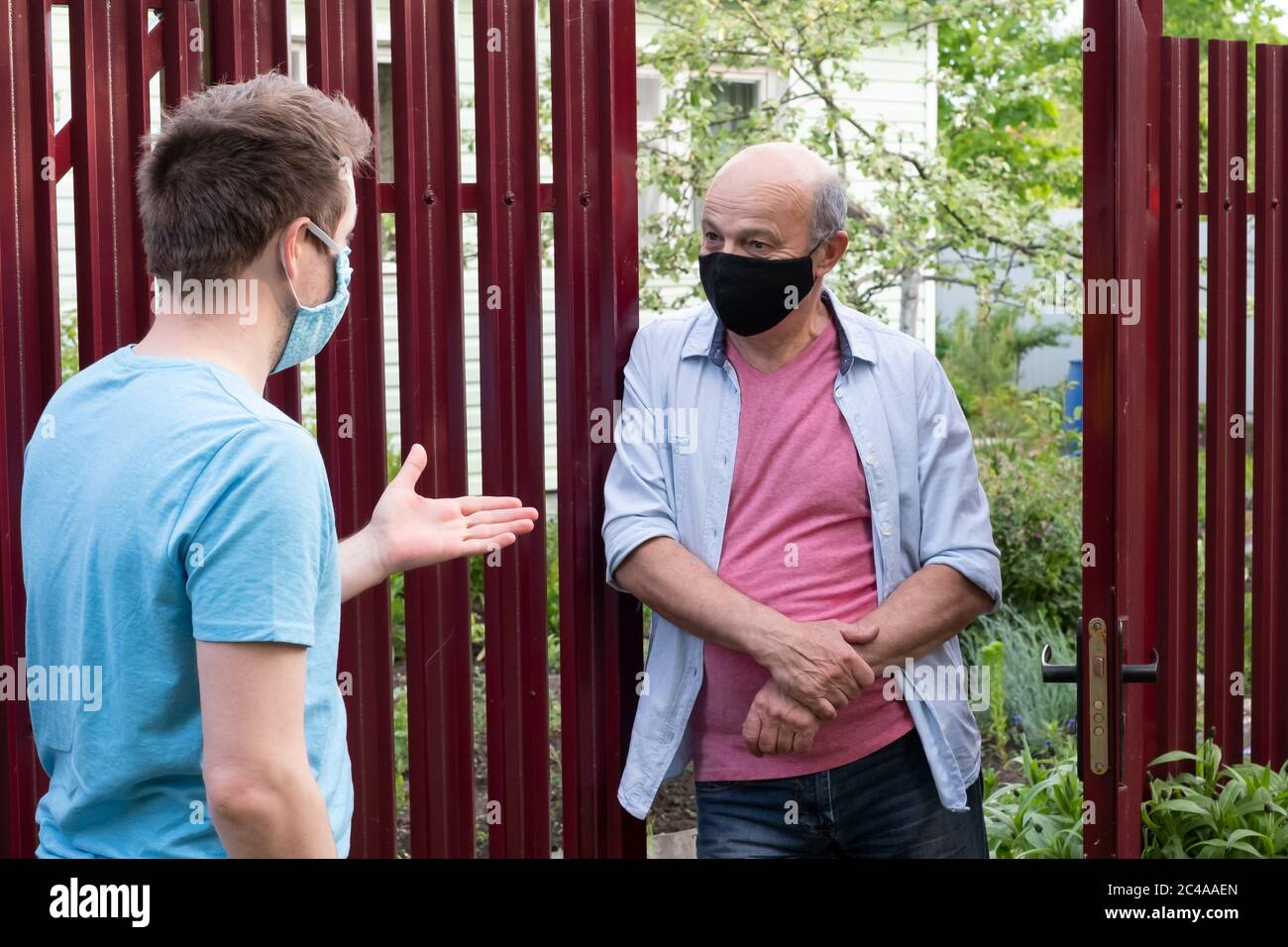 Two men talking in house hi-res stock photography and images - Alamy
