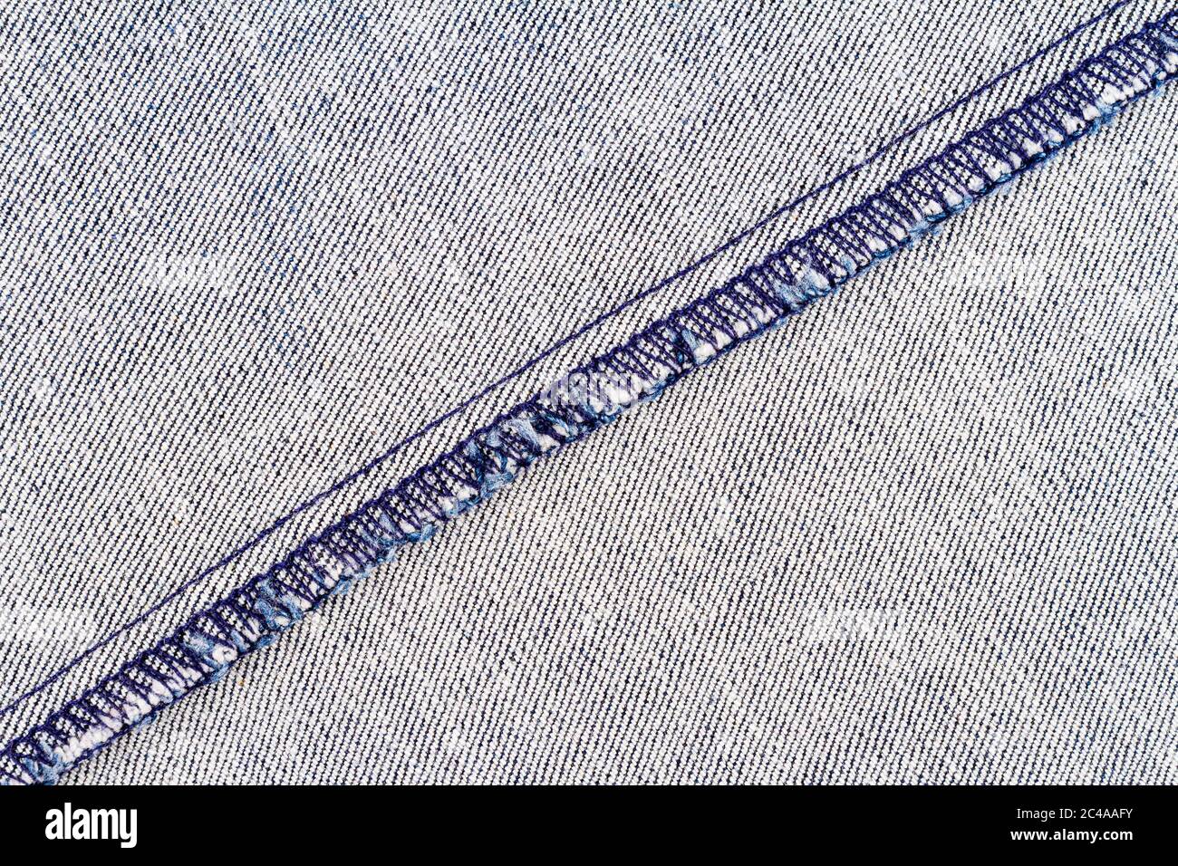 Wrong side of jeans fabric with back seam Stock Photo - Alamy