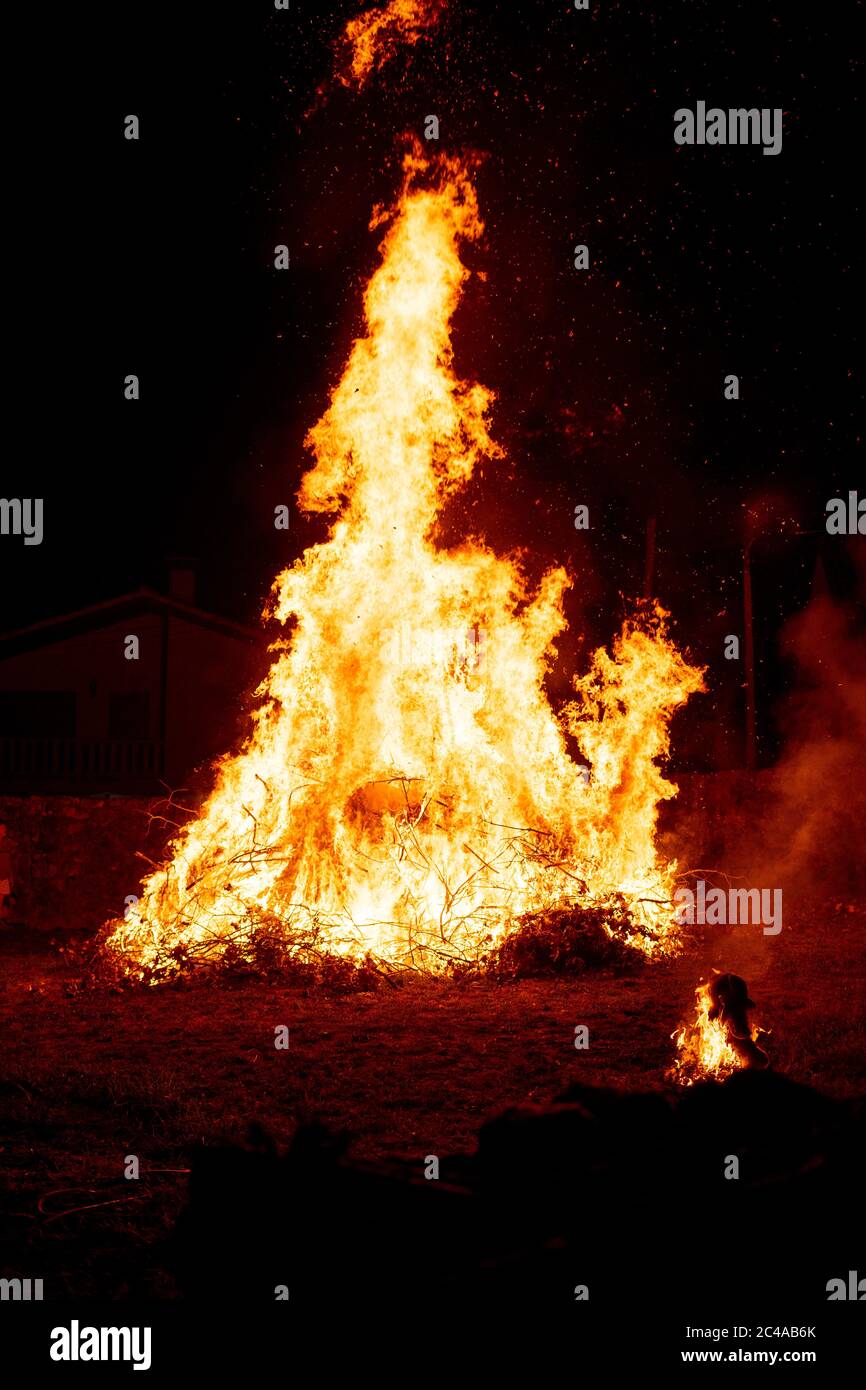 Giant bonfire burning in the night Stock Photo - Alamy