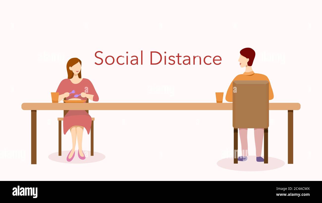 Social distance concept in restaurant : a man and a woman sit a ...