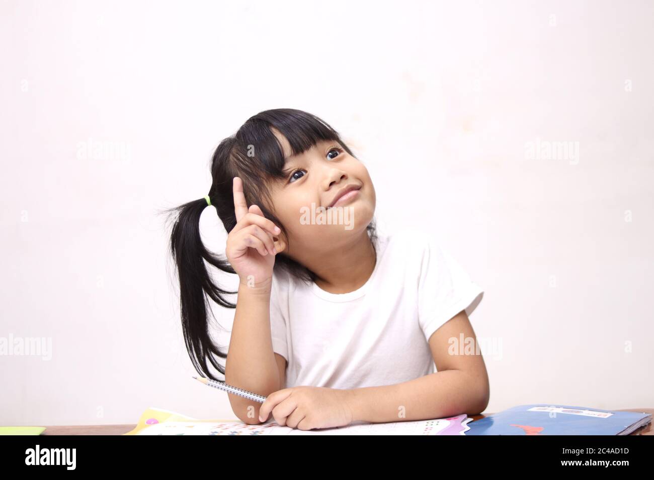 Cute chinese baby girl thinking hi-res stock photography and images - Alamy