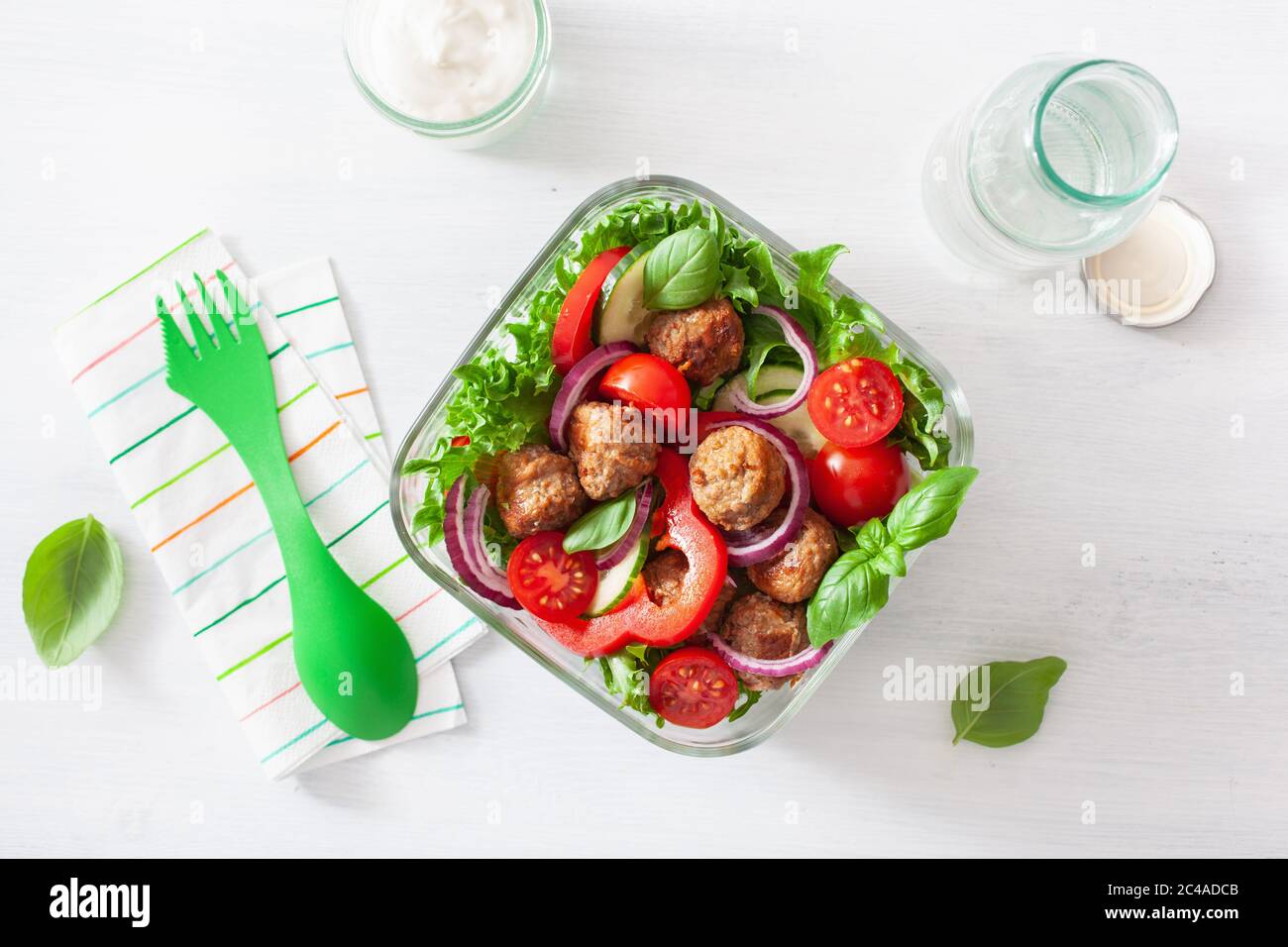 keto paleo lunch box with meatballs, lettuce, tomato, cucumber, bell ...