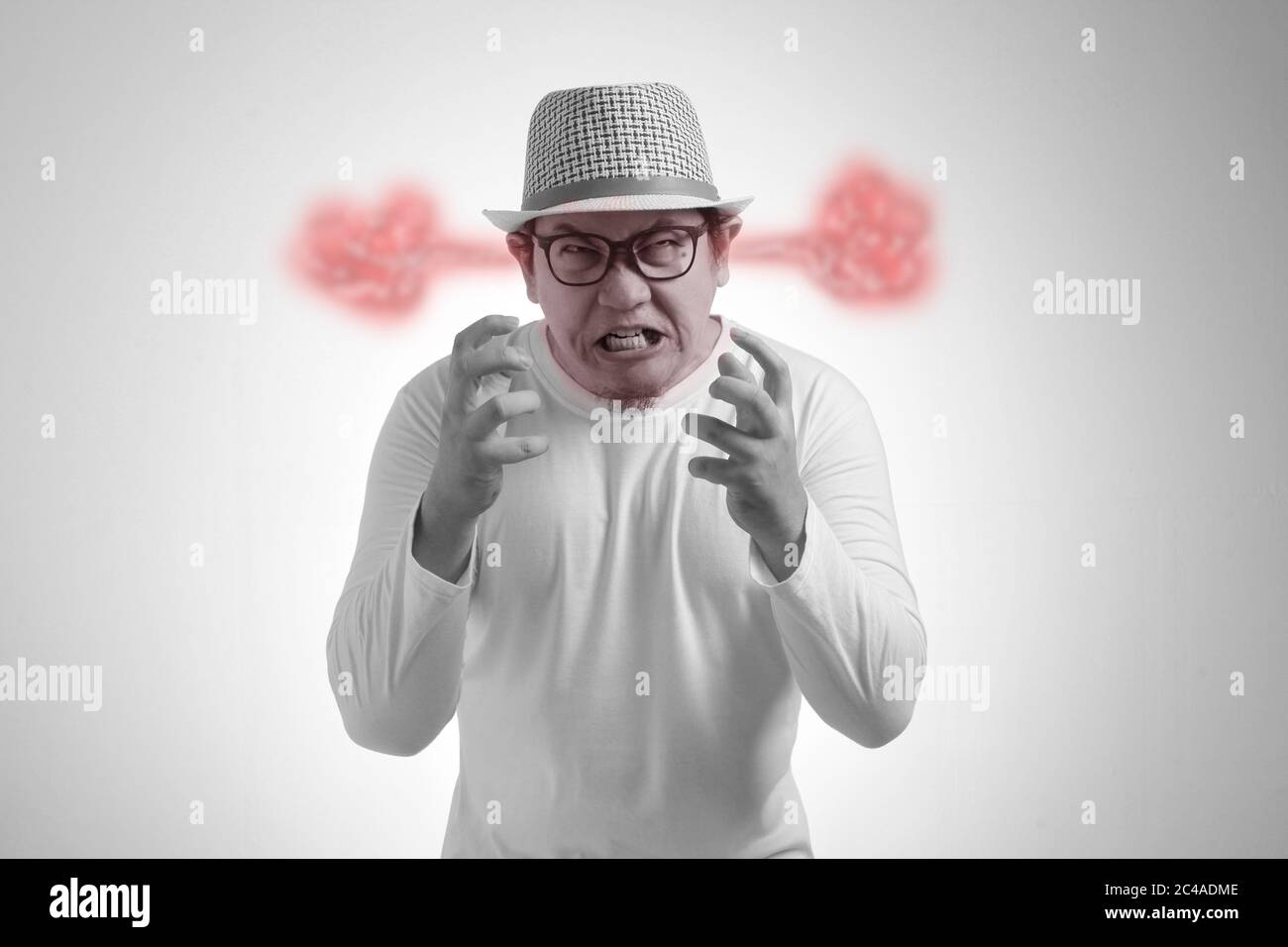 Young Asian man wearing white shirt shouting because of anger. Close up ...