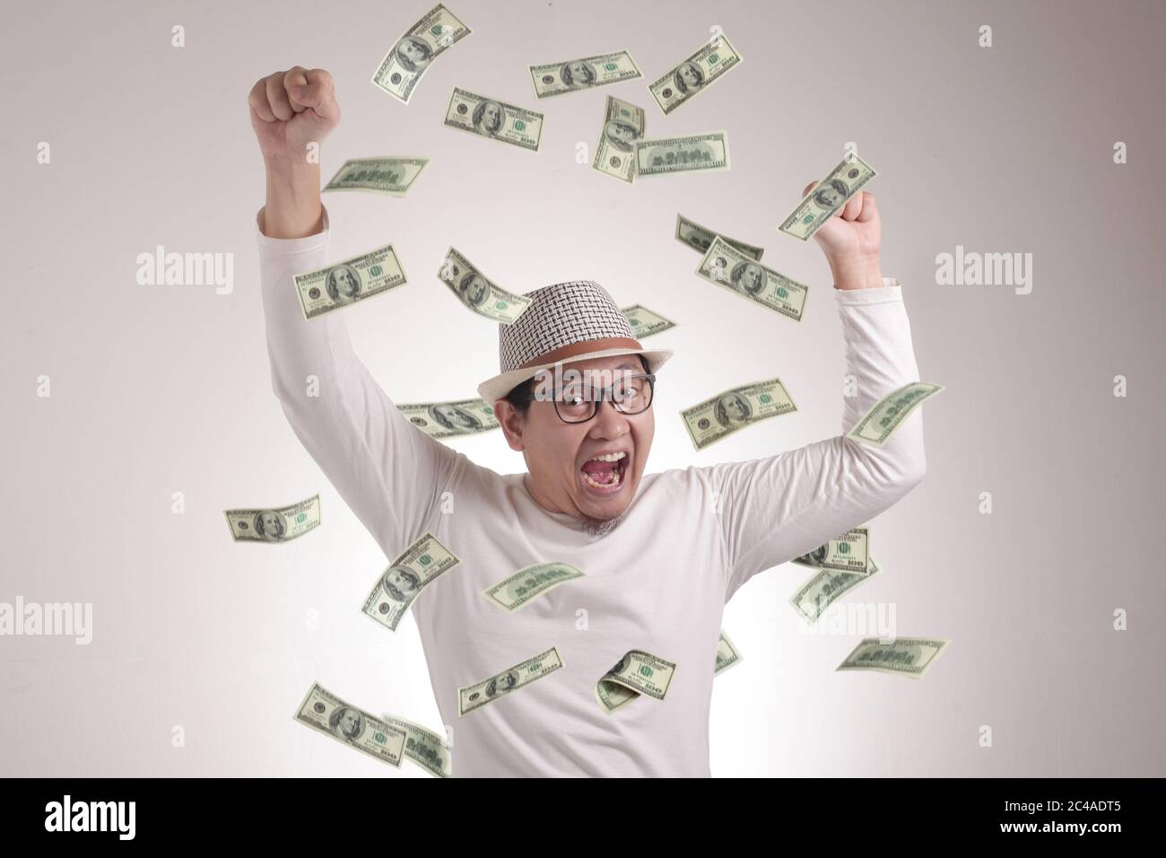 Portrait happy Asian man pumping fists ecstatic celebrates success ...