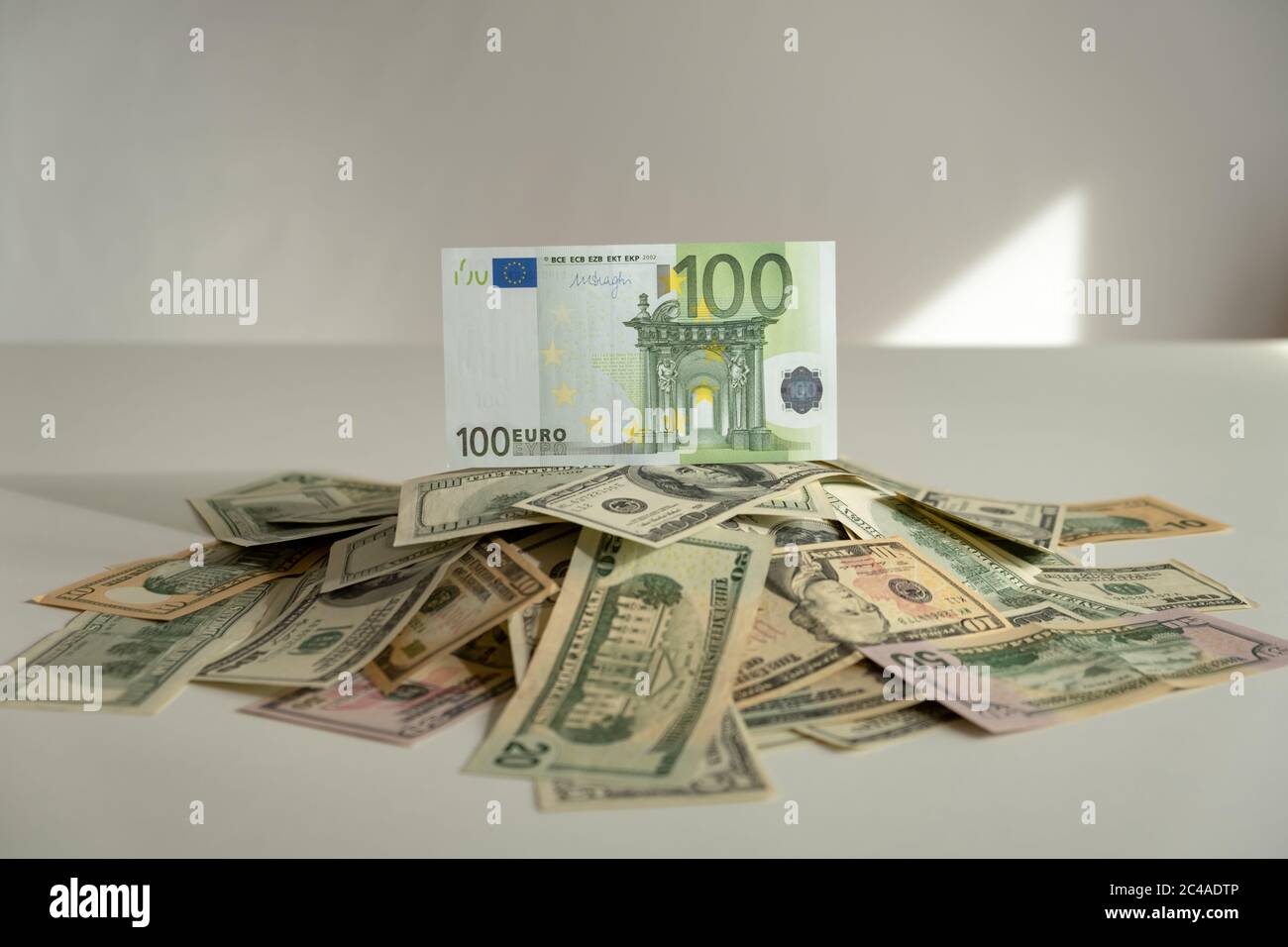 pile of dollars and euro. One hundred euro Stock Photo - Alamy