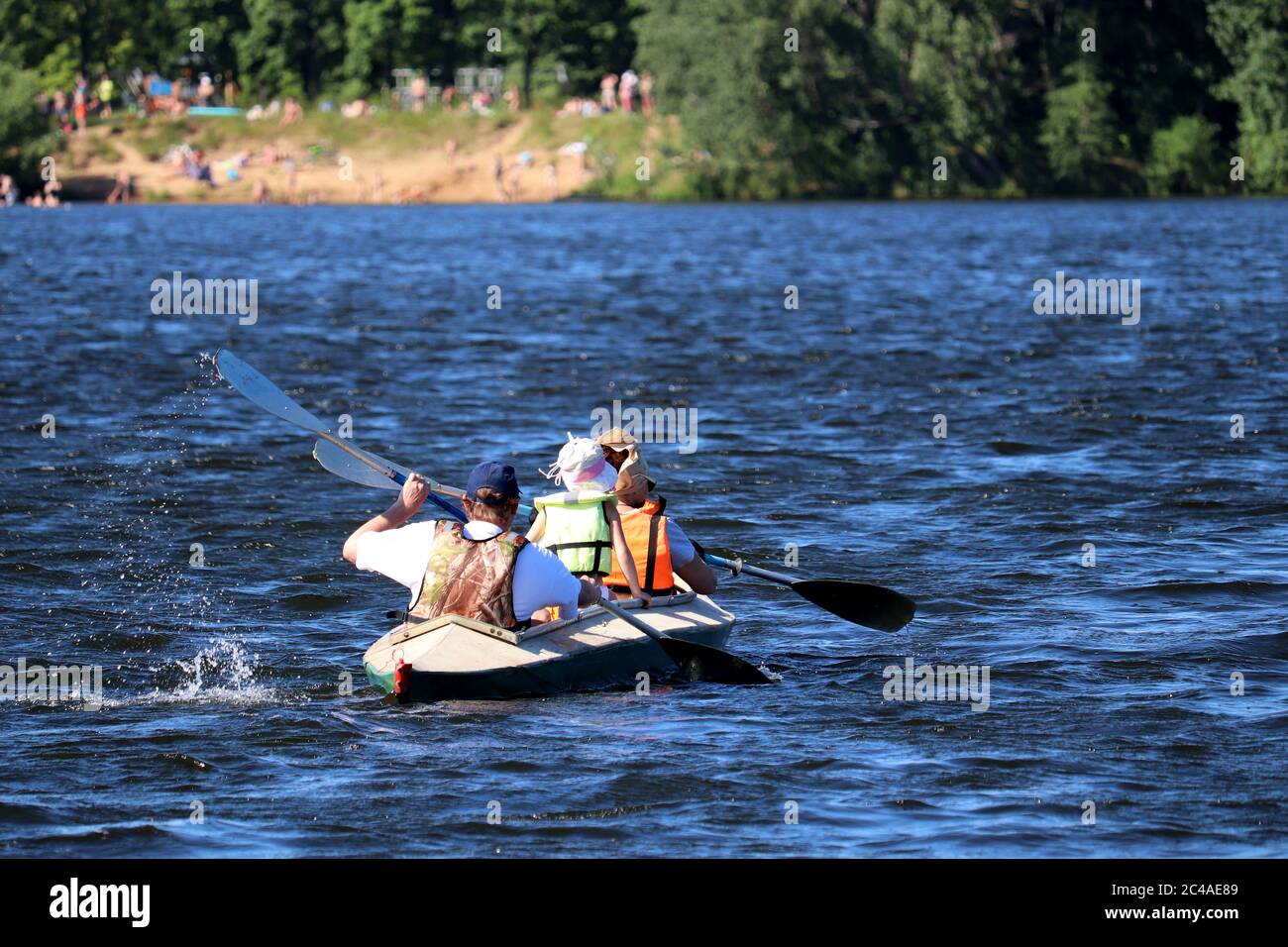 Children paddle kayak hi-res stock photography and images - Alamy