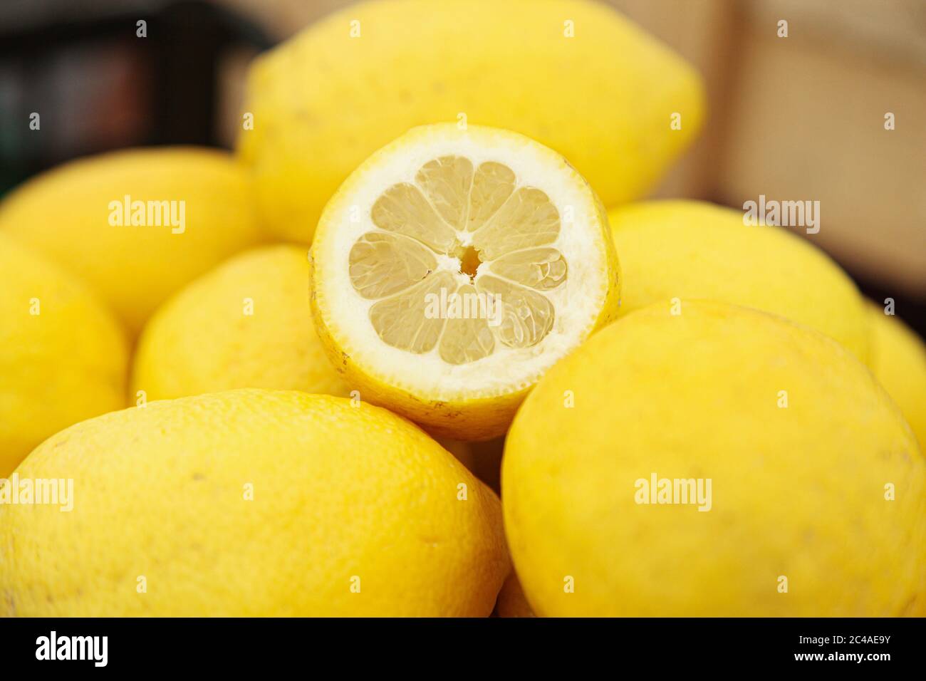 Whole and half cut lemon in the stock Stock Photo - Alamy