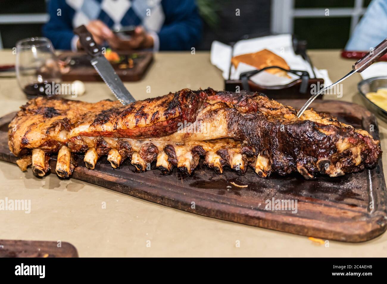 "Parrillada" Argentine barbecue make on live coal (no flame), beef "asado", bread, "Chorizo" and ...