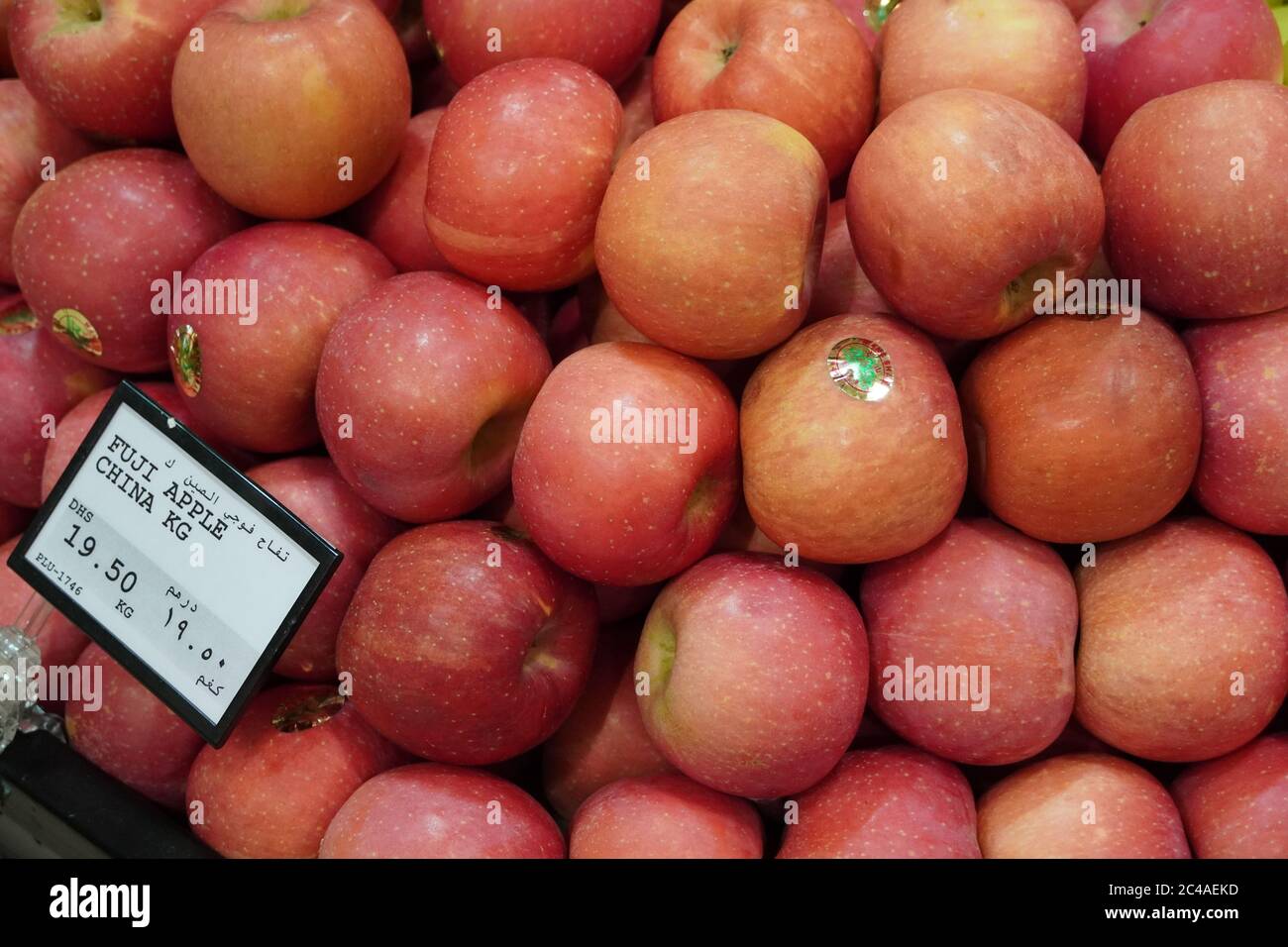 Dubai UAE - November 2019: Bunch of pink apples on boxes in supermarket ...