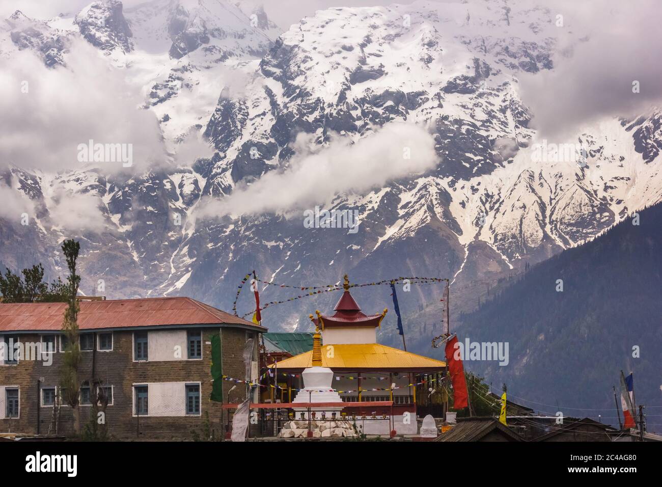 The ancient, yellow roofed Buddhist monastery with the backdrop of the ...