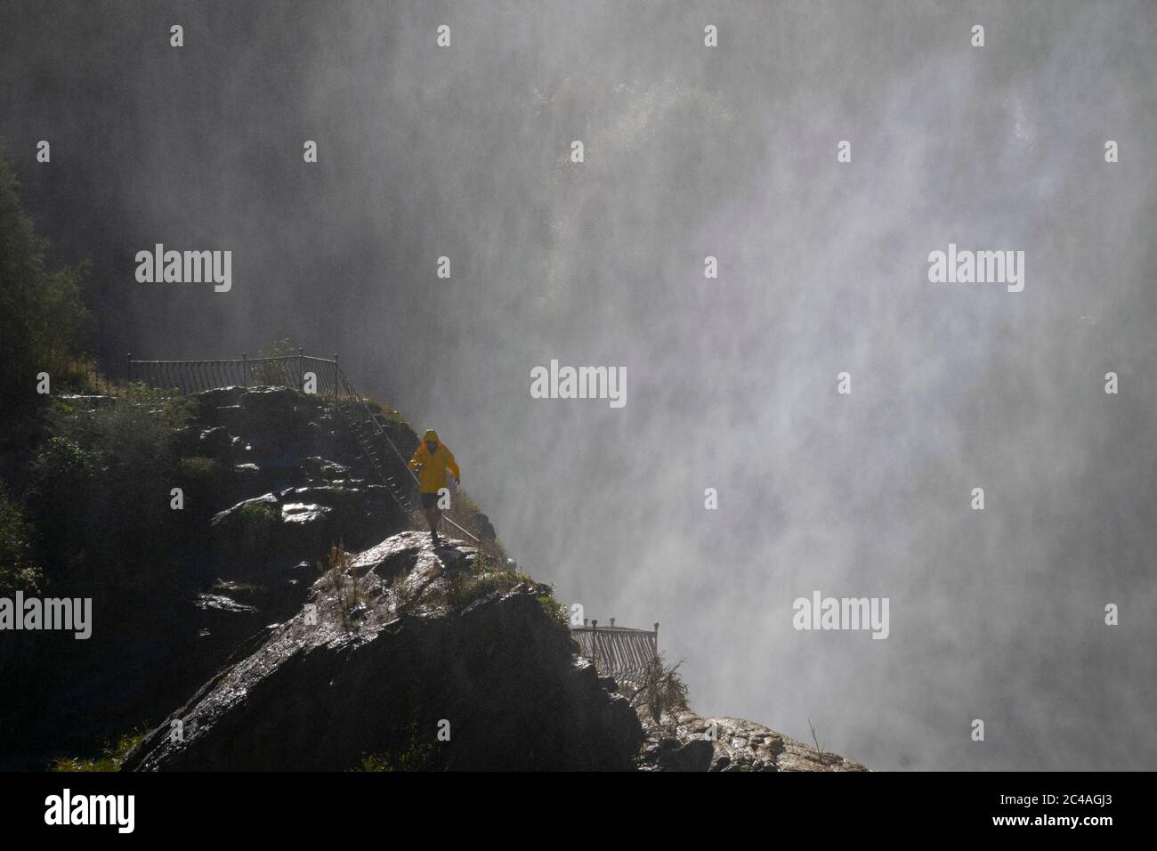 Man walking against the big waterfall in Tortum. Explore the world's ...