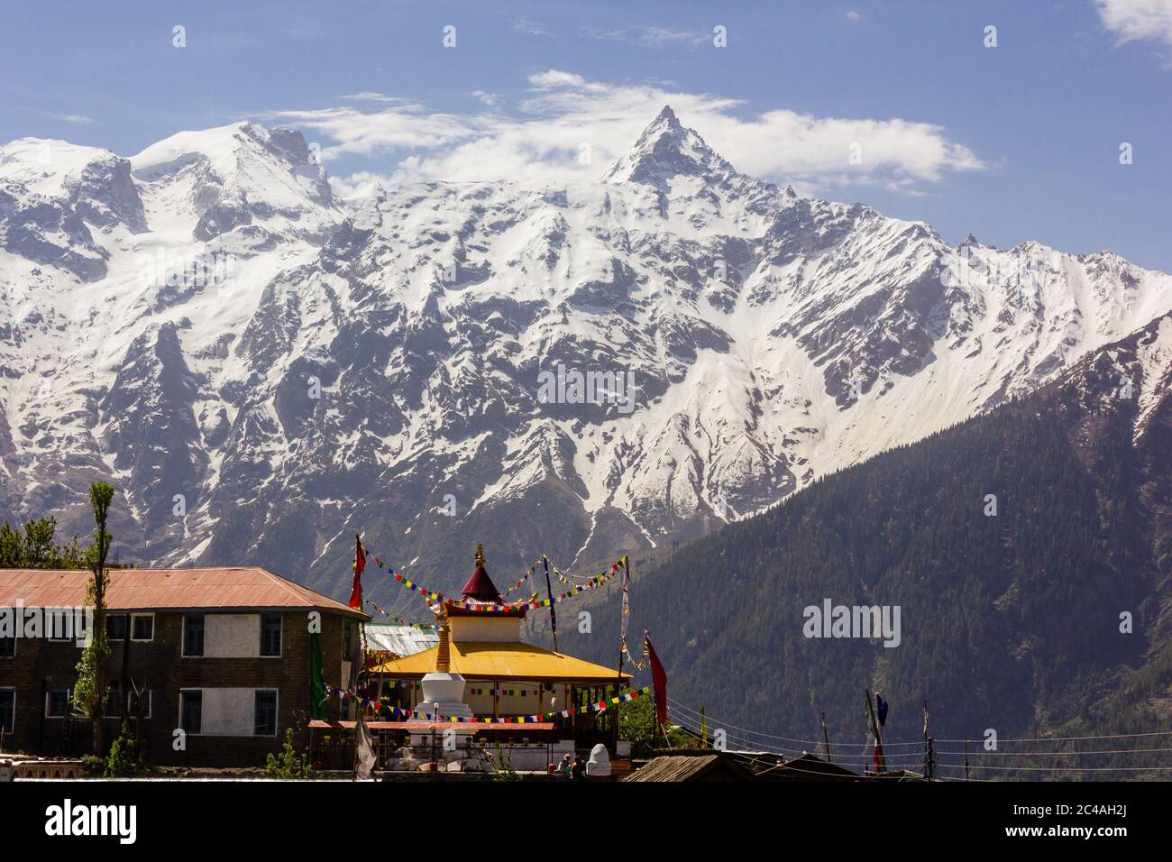 The ancient, yellow roofed Buddhist monastery with the backdrop of the ...