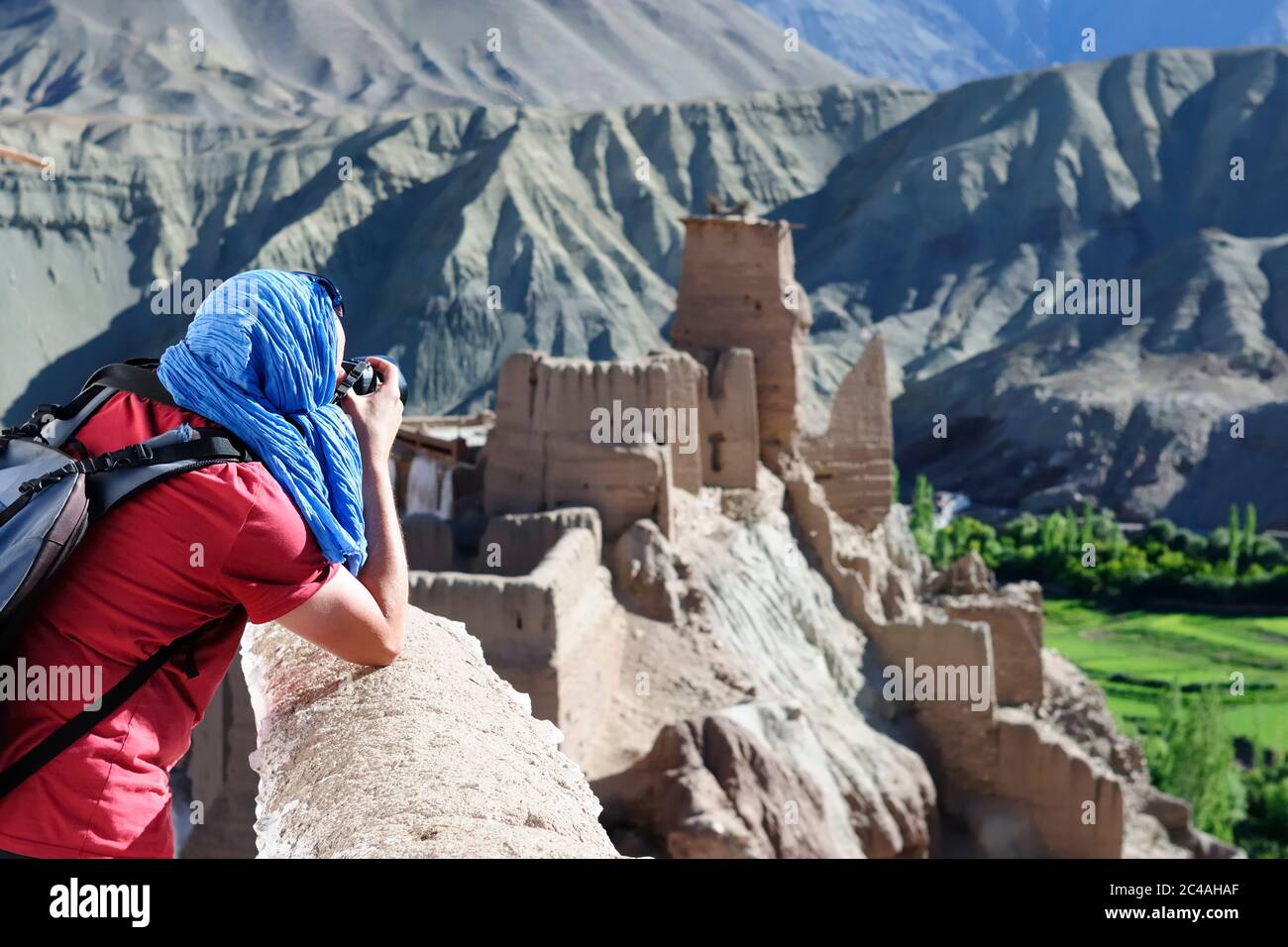 View on Basgo Fort, the tourist is taking the photograph during the ...