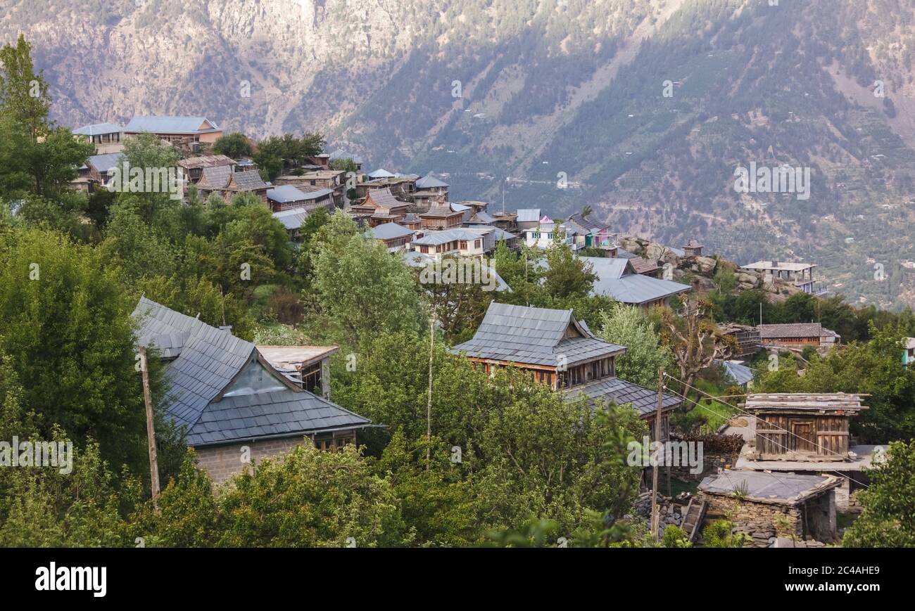 The traditional, slate roofed, wood and stone houses surrounded by ...
