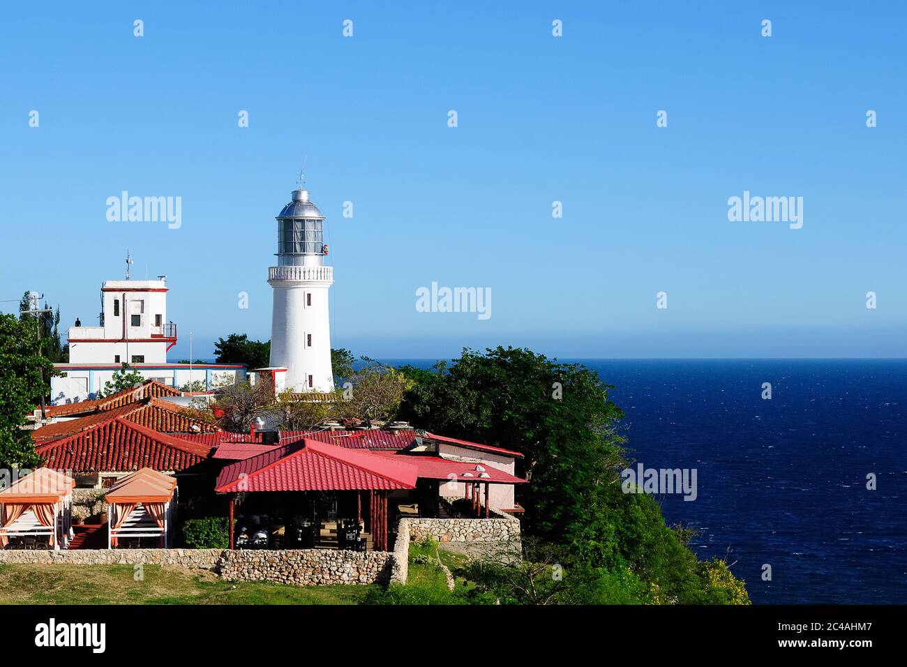 View on the Santiago de Cuba lighthouse from the fort Castillo de San ...