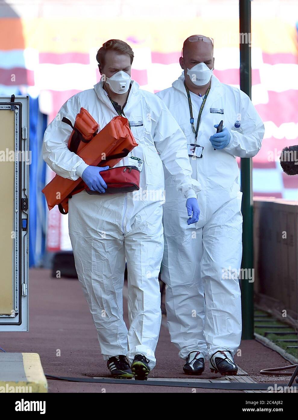 Medical staff wearing PPE before the Premier League match at Turf Moor ...