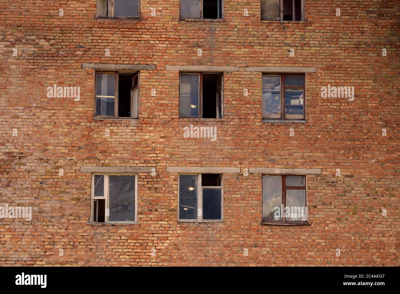 Old brick dormitory building of the times of the USSR. Soviet ...