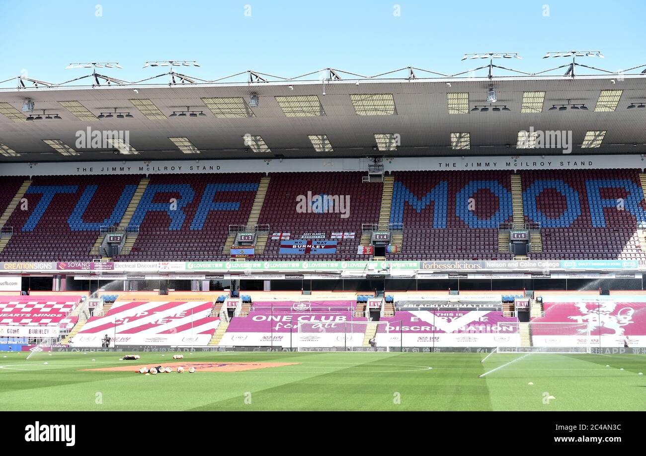 The pitch is watered before the Premier League match at Turf Moor ...