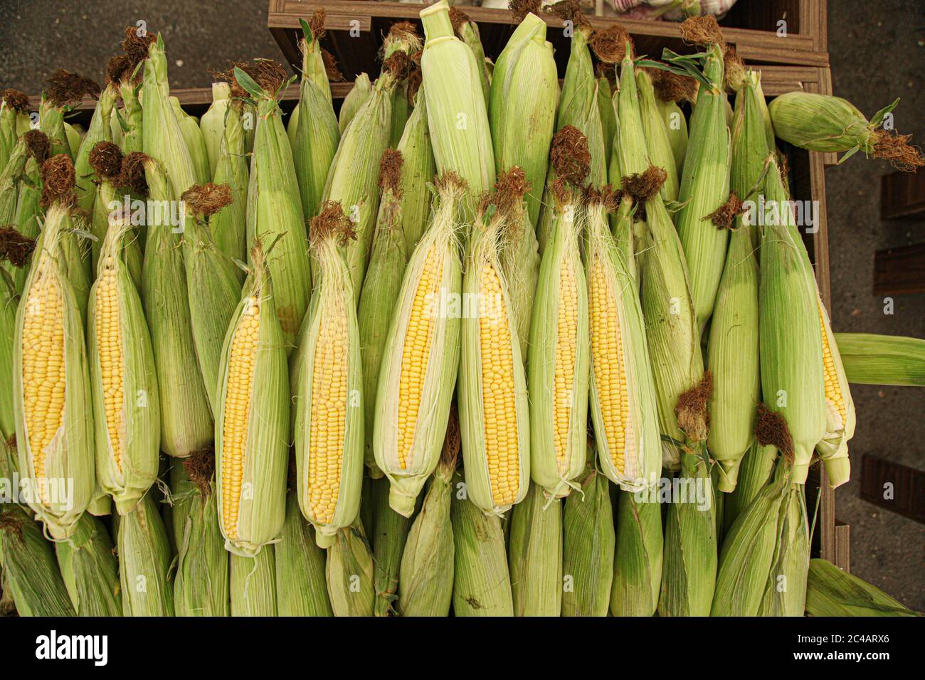 Corns in the grocery shop, top view Stock Photo - Alamy