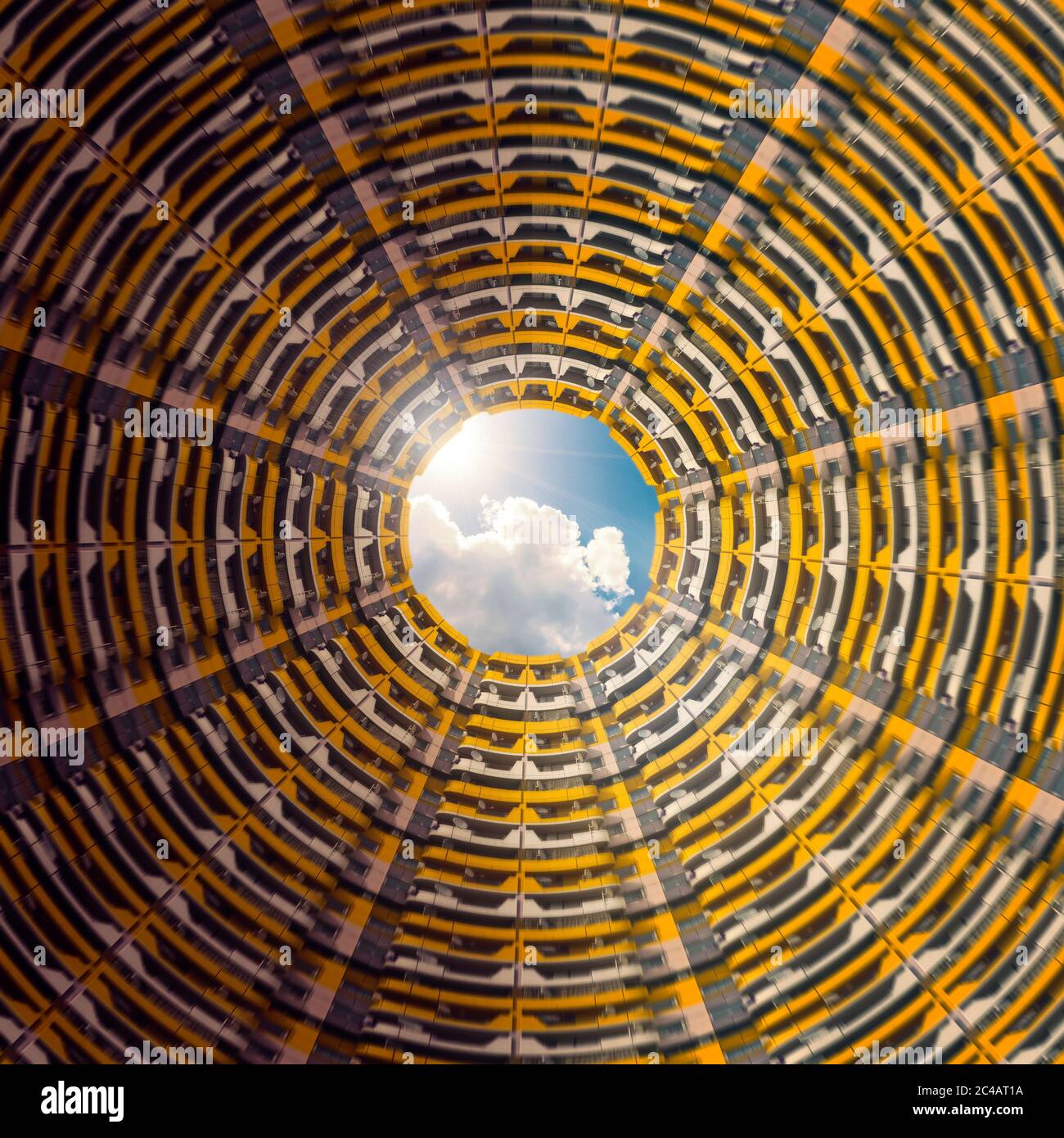 Composition, round courtyard of a high-rise building with yellow ...