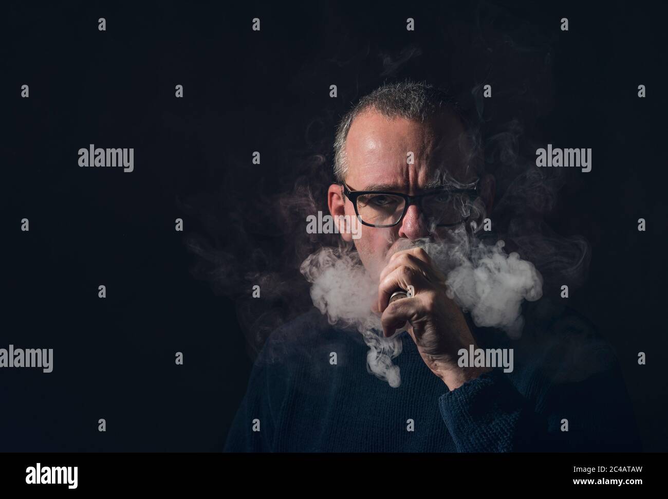 Old man vaping hi-res stock photography and images - Alamy