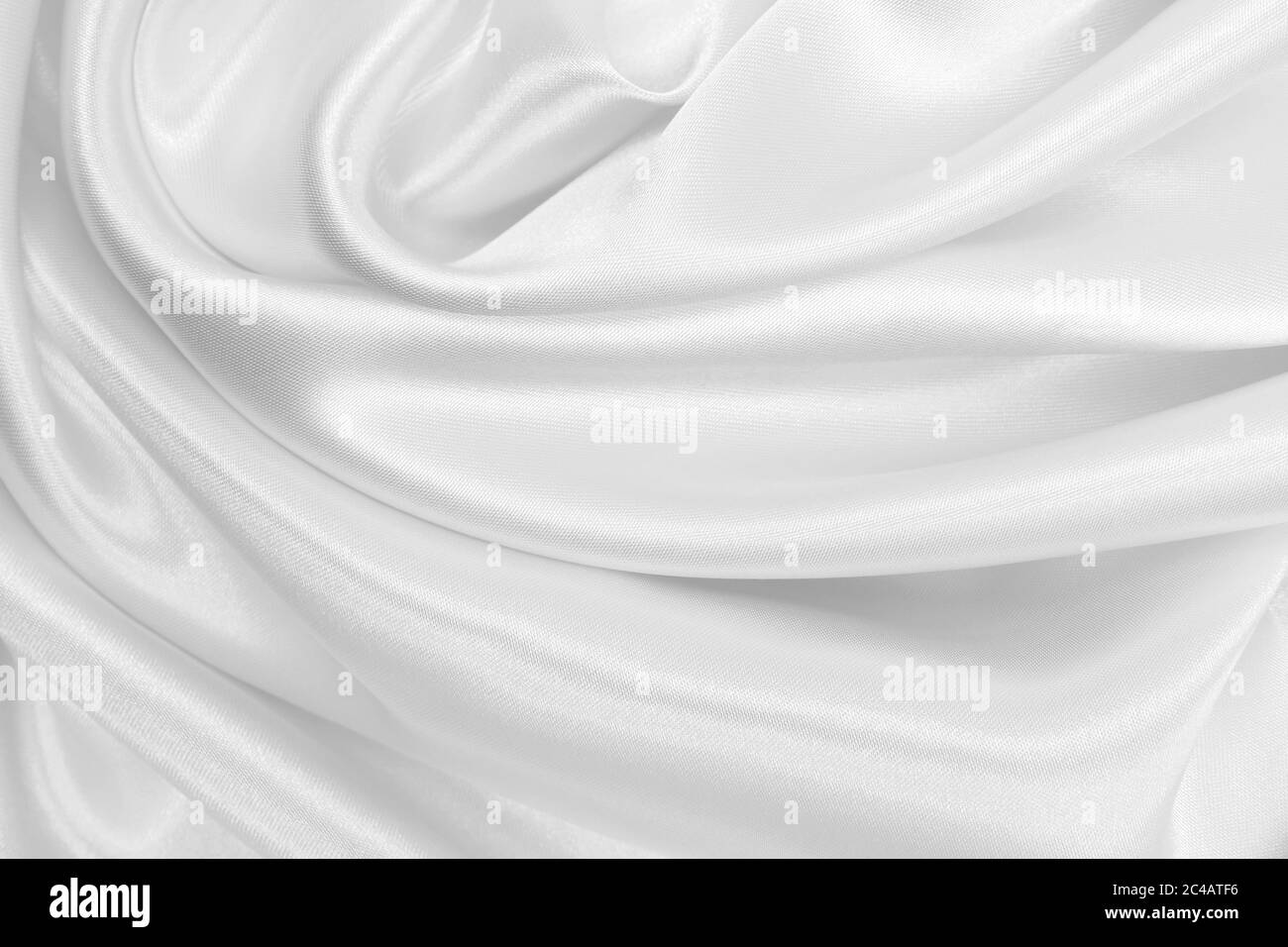 Smooth elegant white silk or satin luxury cloth texture can use as ...