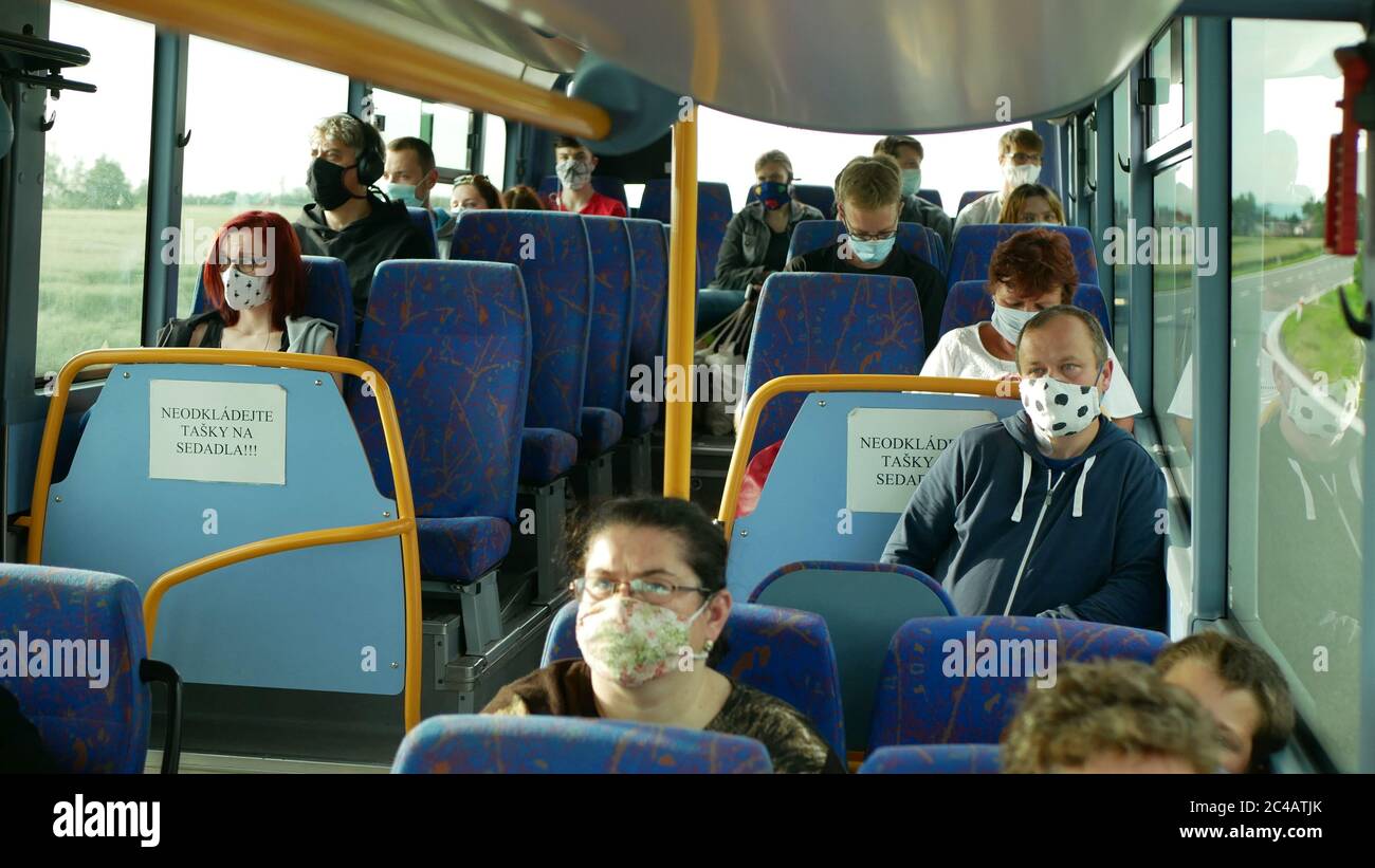 Coronavirus mask face bus crowd turning over people crowd men women bus ...