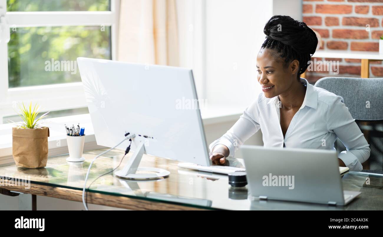 Happy Professional Woman Employee Using Computer For Work Stock Photo ...