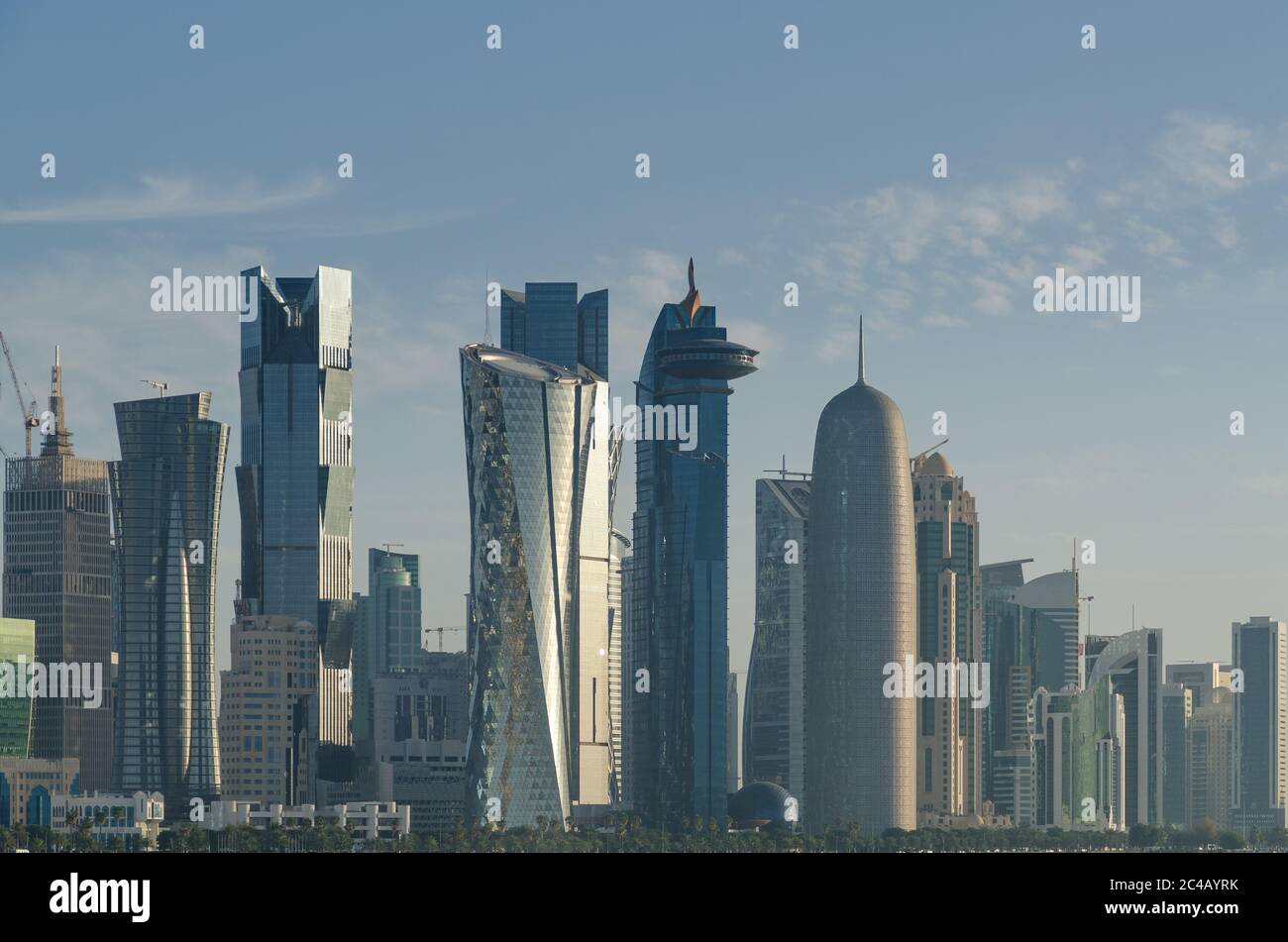 The futuristic urban skyline of Doha, Qatar. Doha is the capital and ...