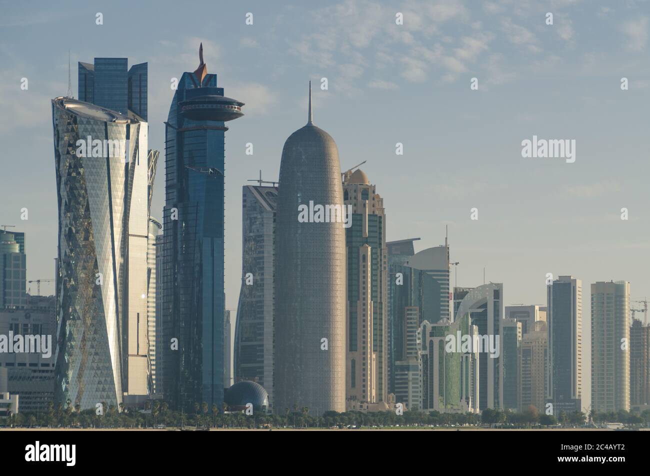 The futuristic urban skyline of Doha, Qatar. Doha is the capital and ...