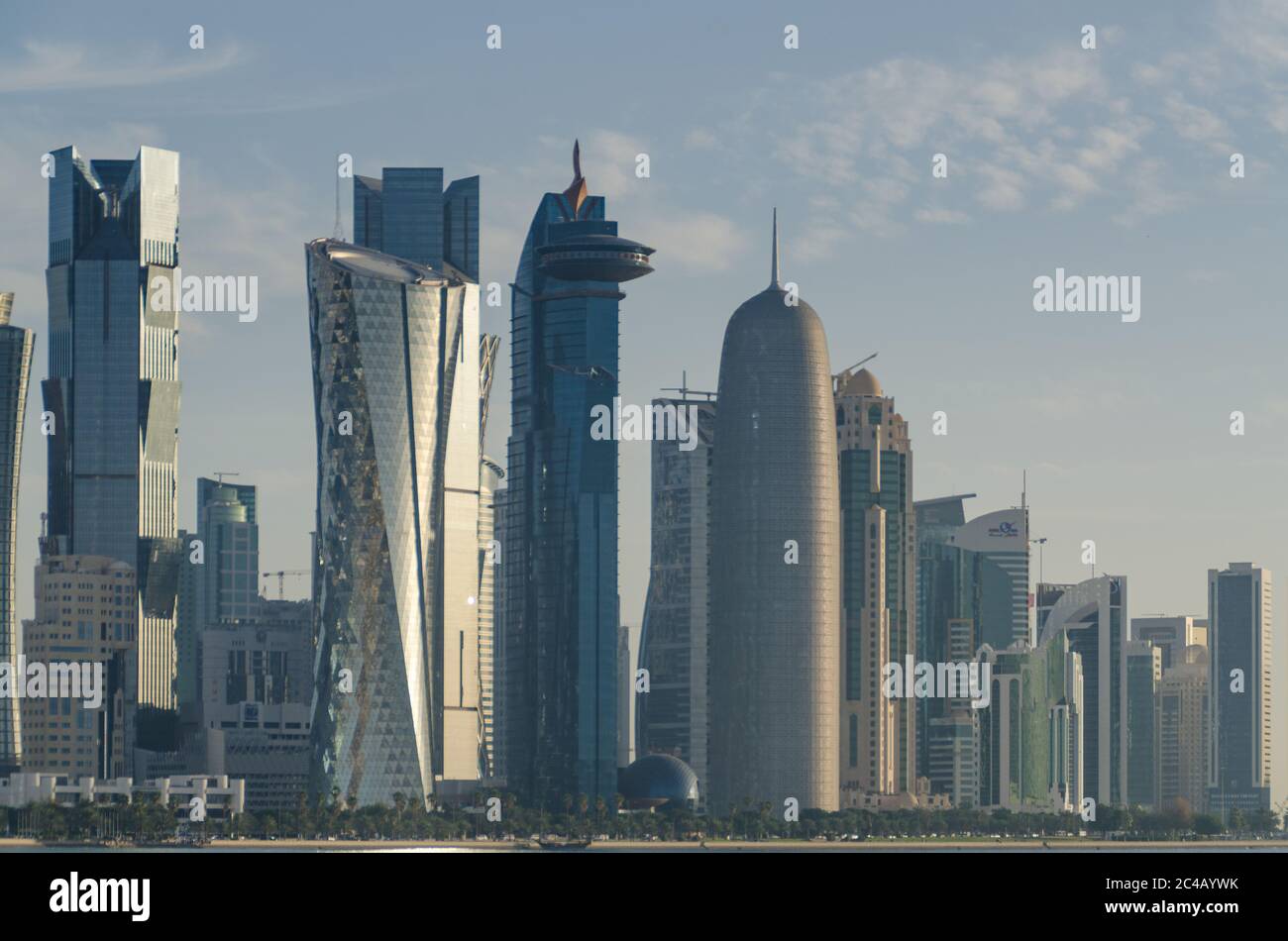 The futuristic urban skyline of Doha, Qatar. Doha is the capital and ...
