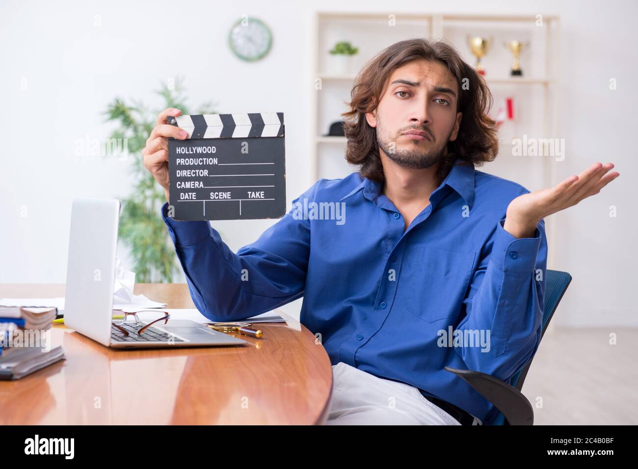 Movie director working in studio Stock Photo - Alamy