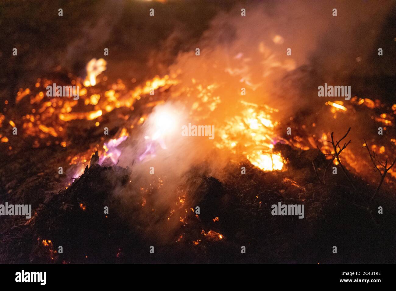 Blazing log fire and log pile hi-res stock photography and images - Alamy