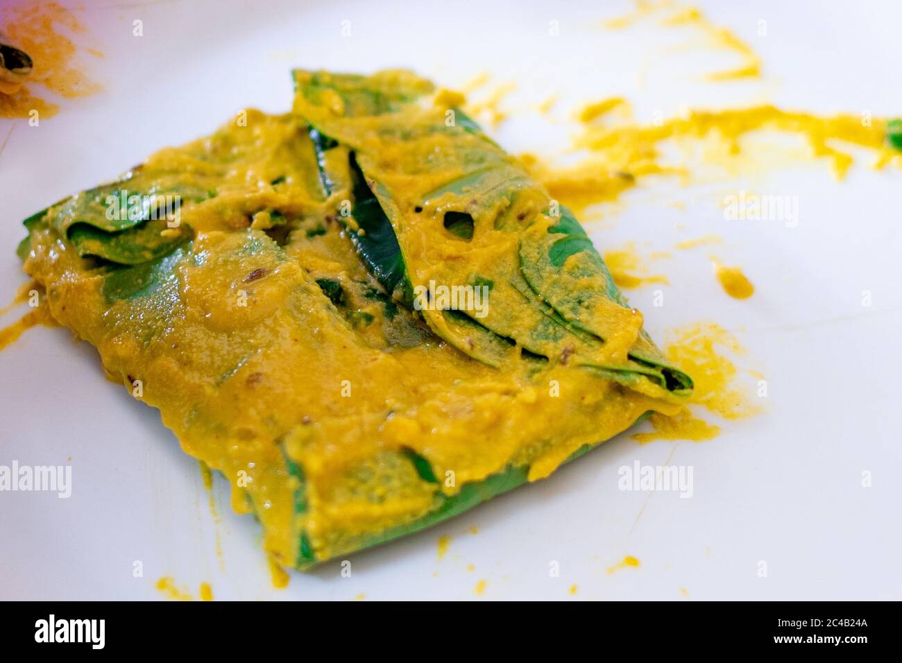 Beautiful Arvi colocasia root leaves coated with flour gram and ...