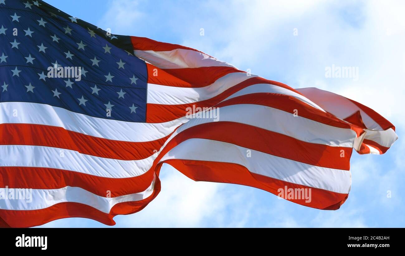 American flag waving hi-res stock photography and images - Alamy