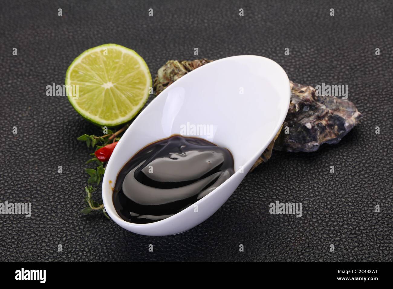 Traditional Oyster sauce in the bowl Stock Photo - Alamy