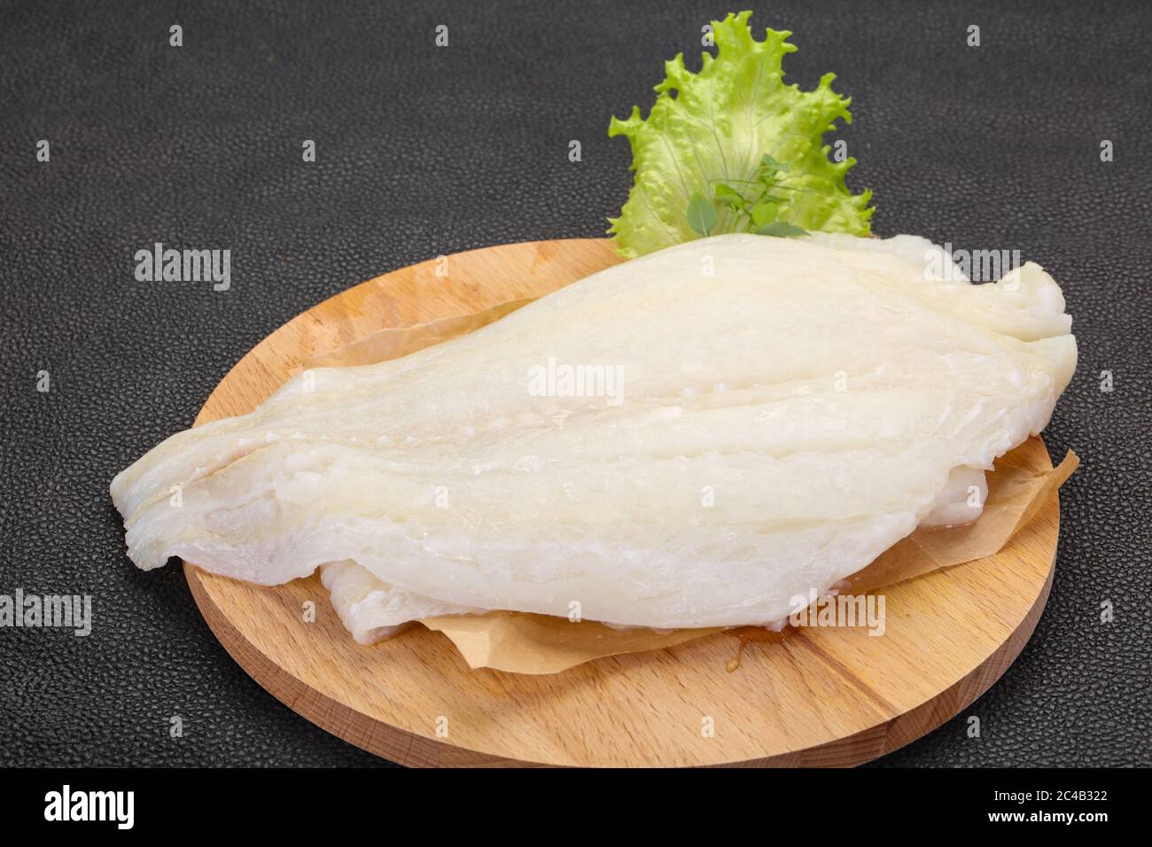 Raw halibut fillet ready for cooking Stock Photo - Alamy