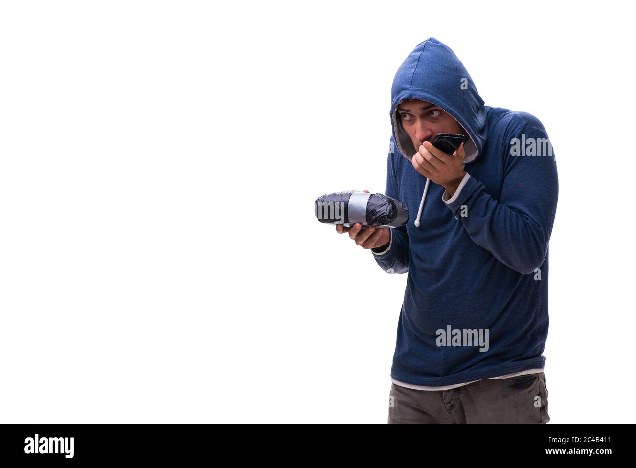 Young drug courier isolated on white background Stock Photo - Alamy